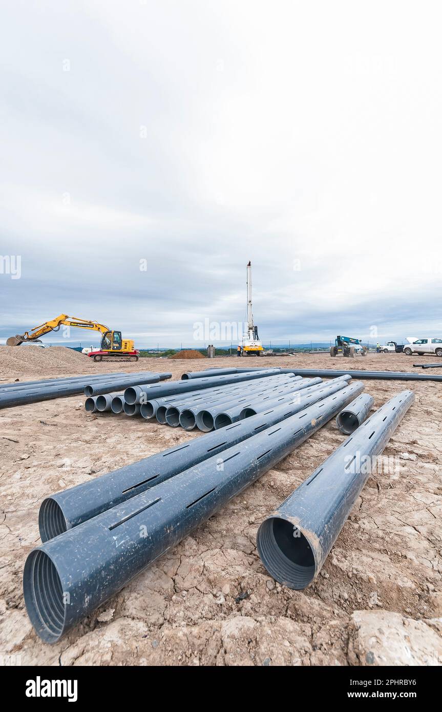 Large slotted plastic pipes used in methane gas wells for collection ...
