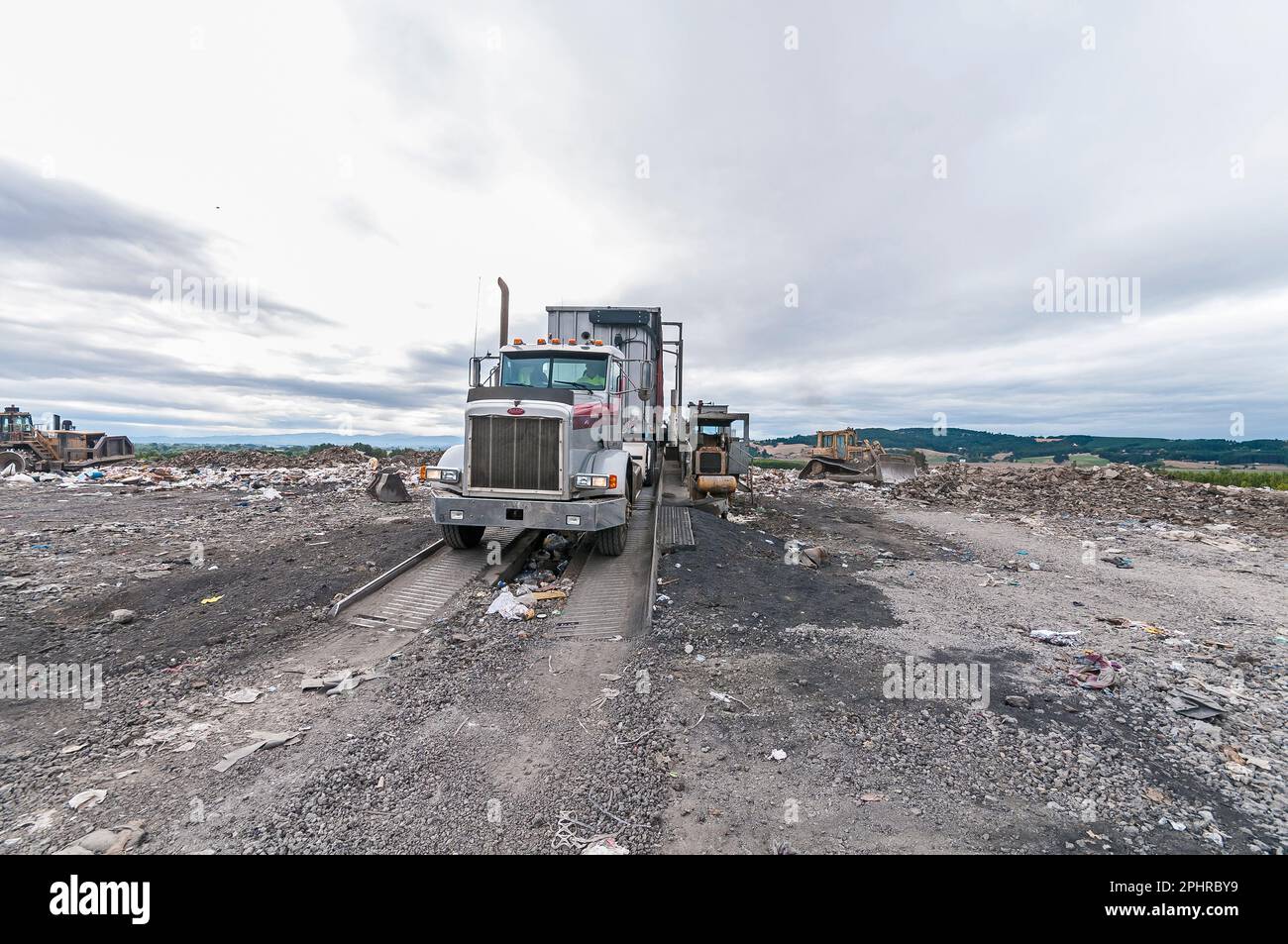 Big rig with semi-trailer on trailer-tipper in an active landfill Stock ...