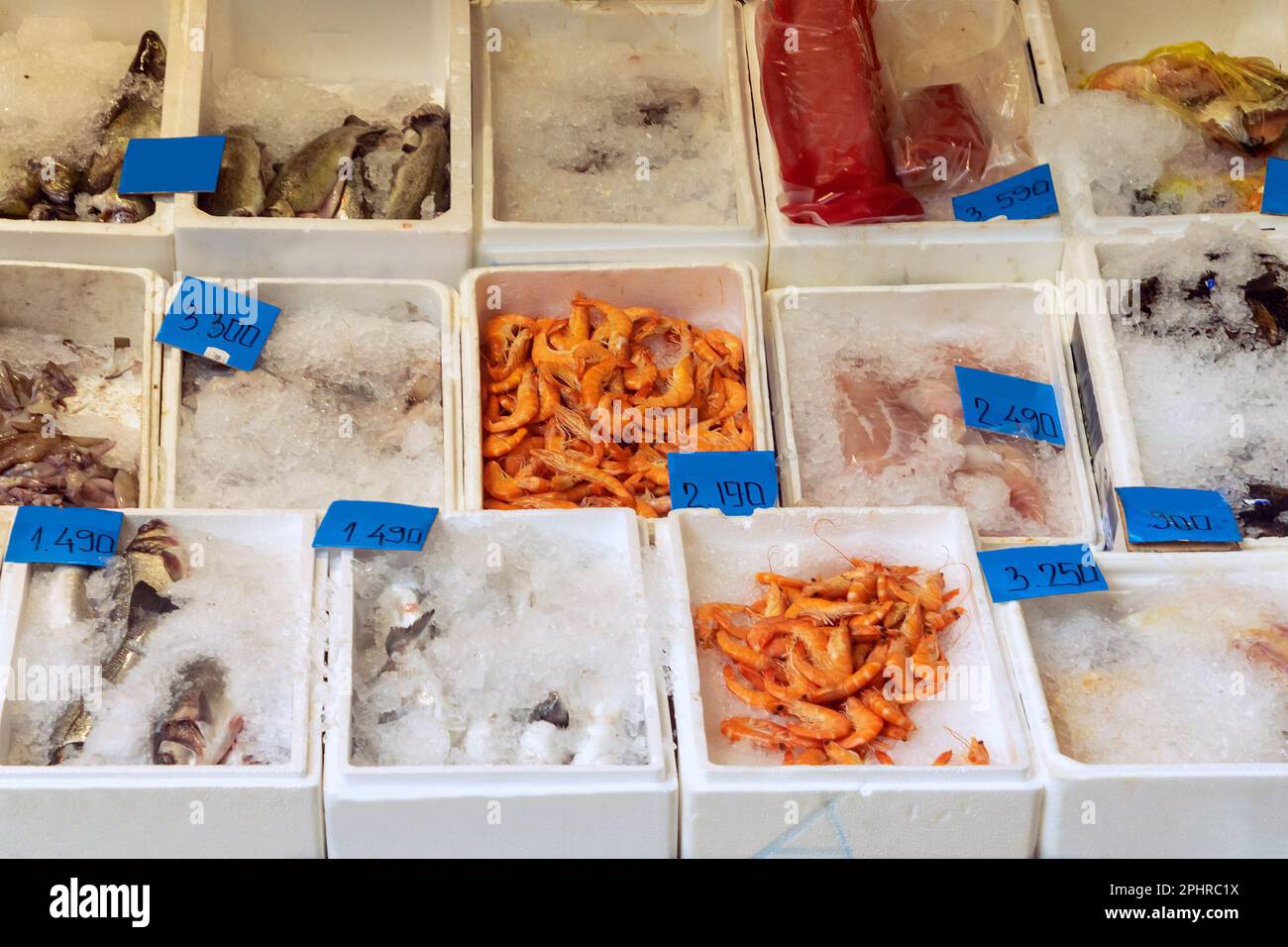 Fresh fish and other sea food kept on ice and sold on local market ...