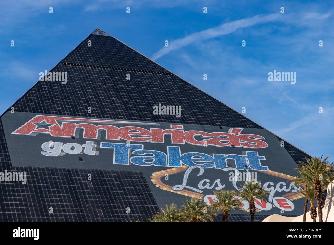 A picture of the Luxor Hotel and Casino pyramid with an ad from America ...