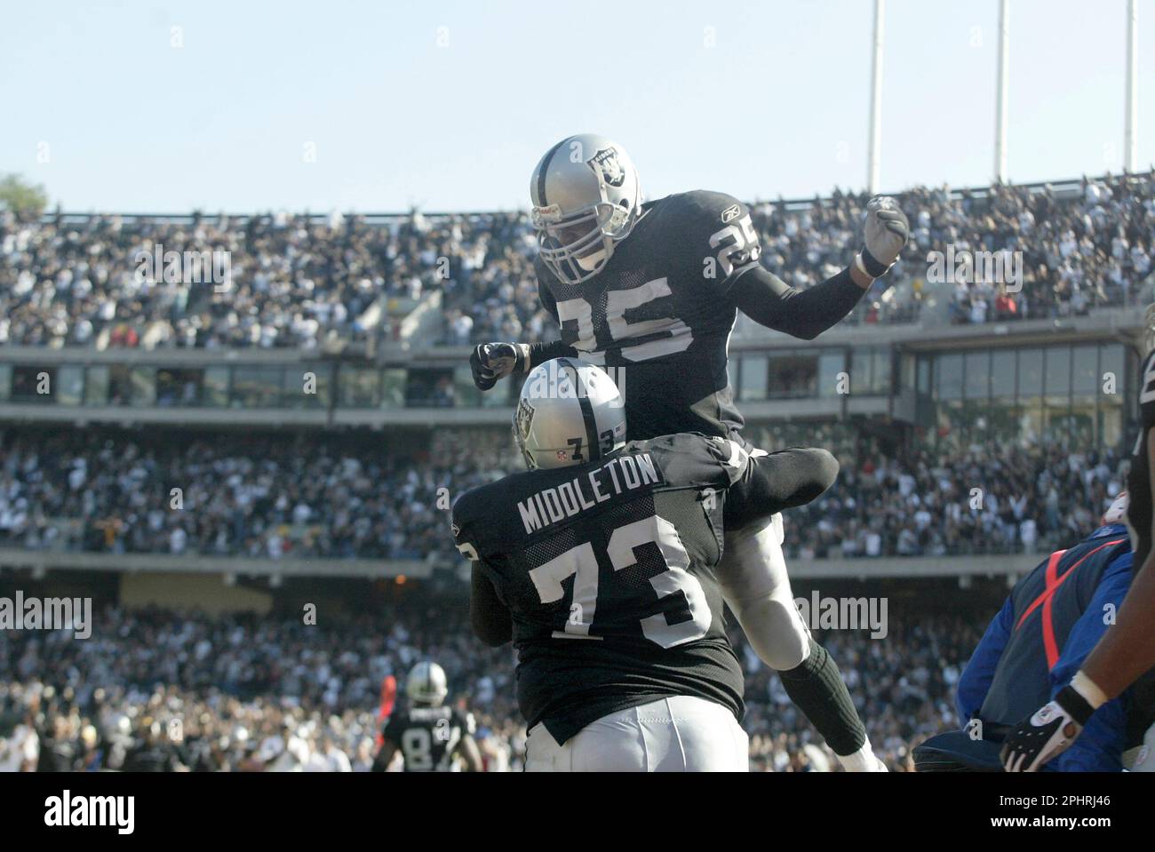 raiders735 ls.JPG Charlie Garner celebrates with Frank Middleton after ...