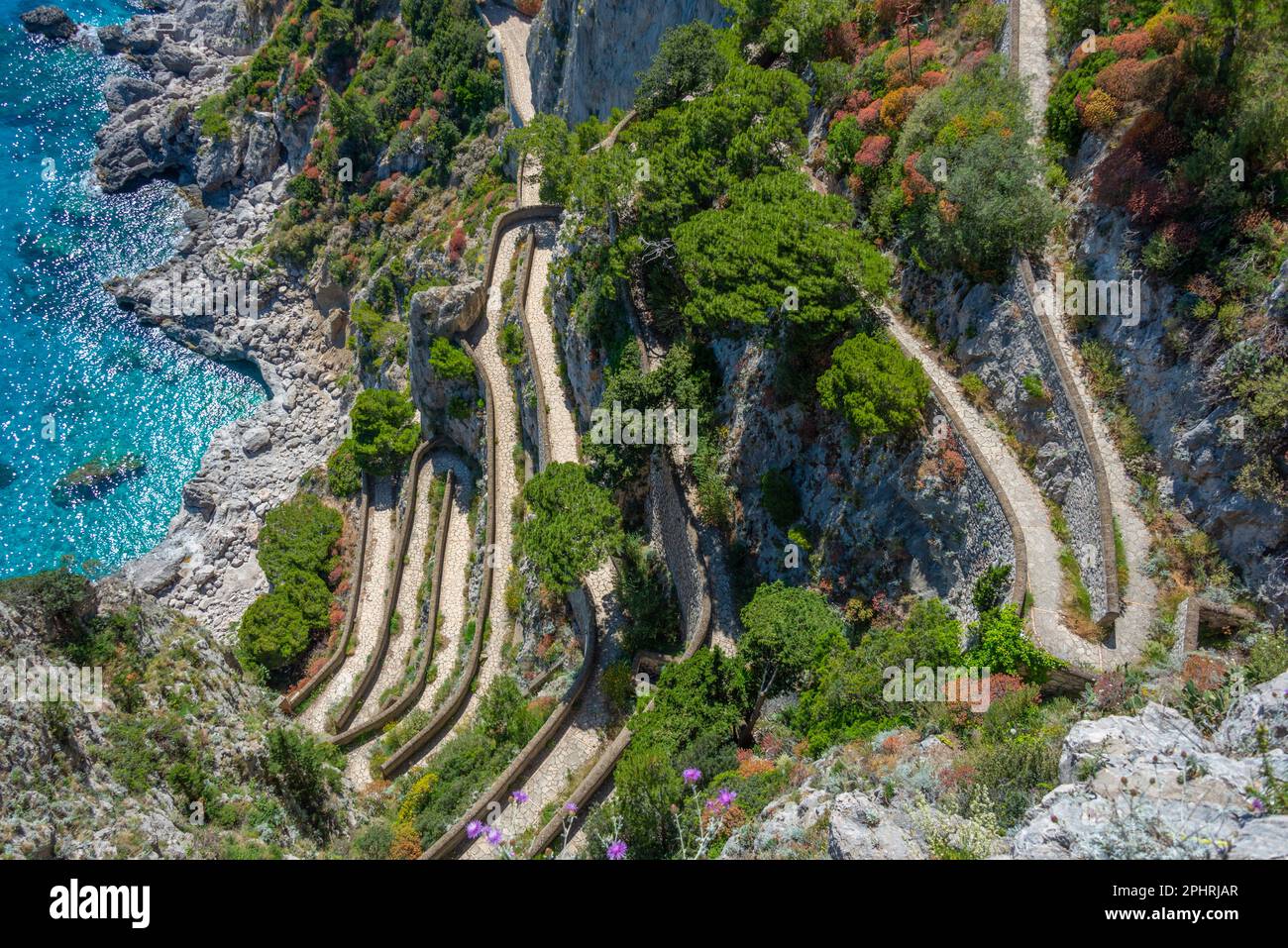 Via Krupp bending around the rocky landscape of Italian island Capri ...
