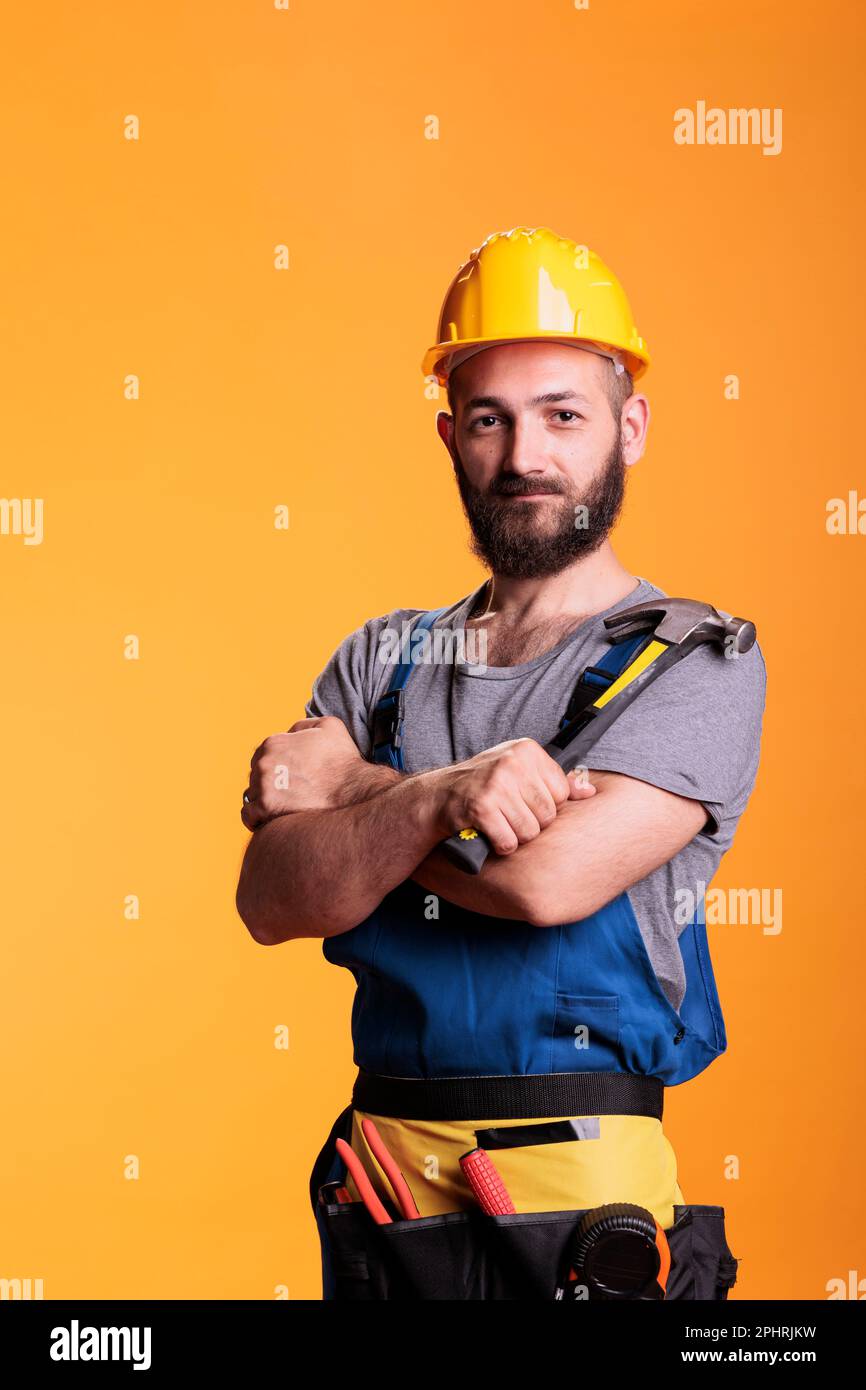 Construction holding sledgehammer hi-res stock photography and images ...