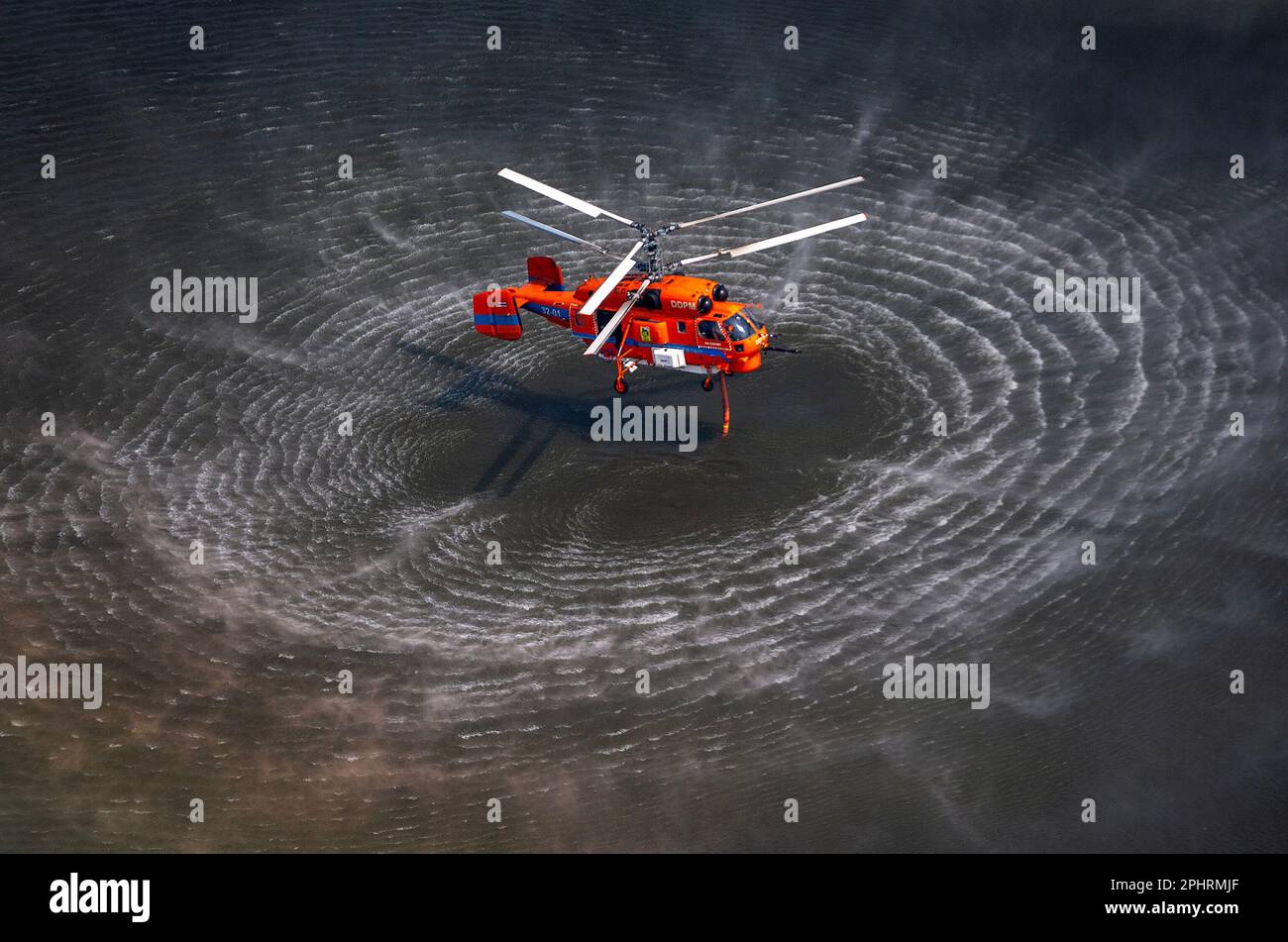 A firefighting KA-32 helicopter from Thai Department of Disaster ...