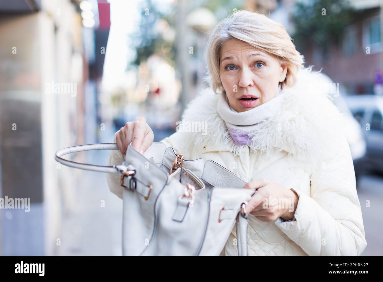 Terrified woman in city hi-res stock photography and images - Alamy