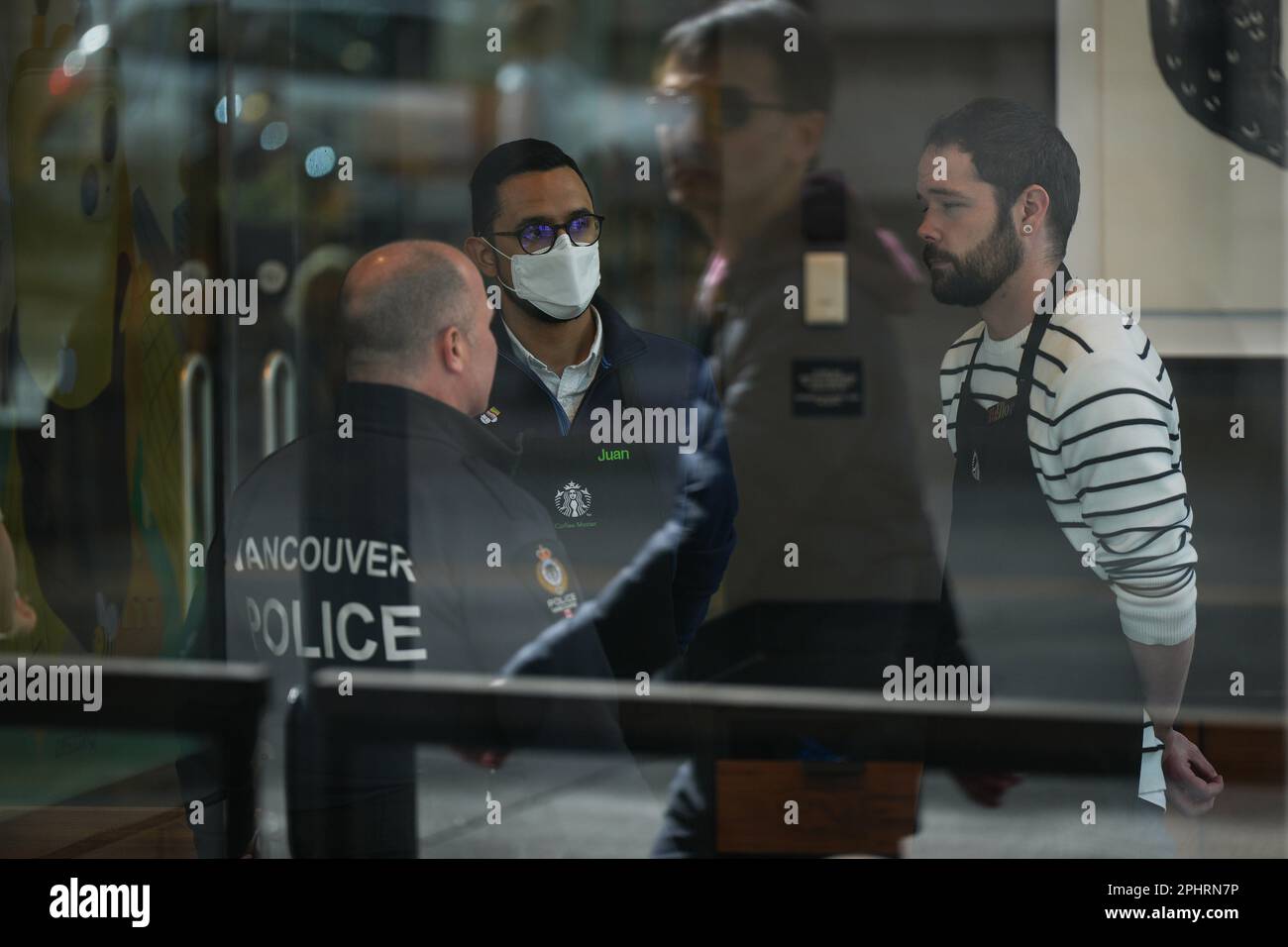 Vancouver, Canada. 29th Mar, 2023. A police officer talks with ...