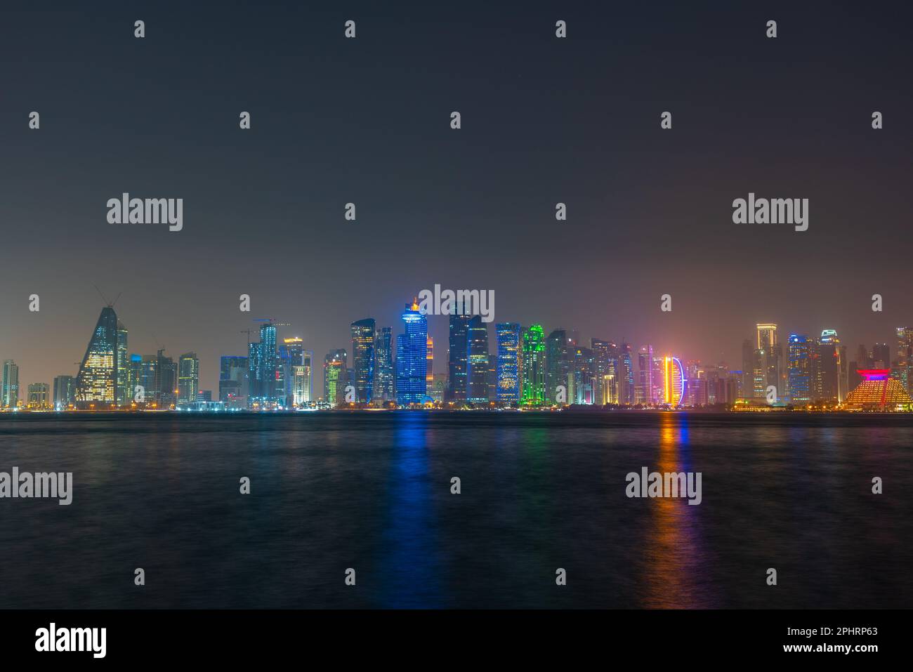 Night view of skyline of Doha - the capital of Qatar Stock Photo - Alamy