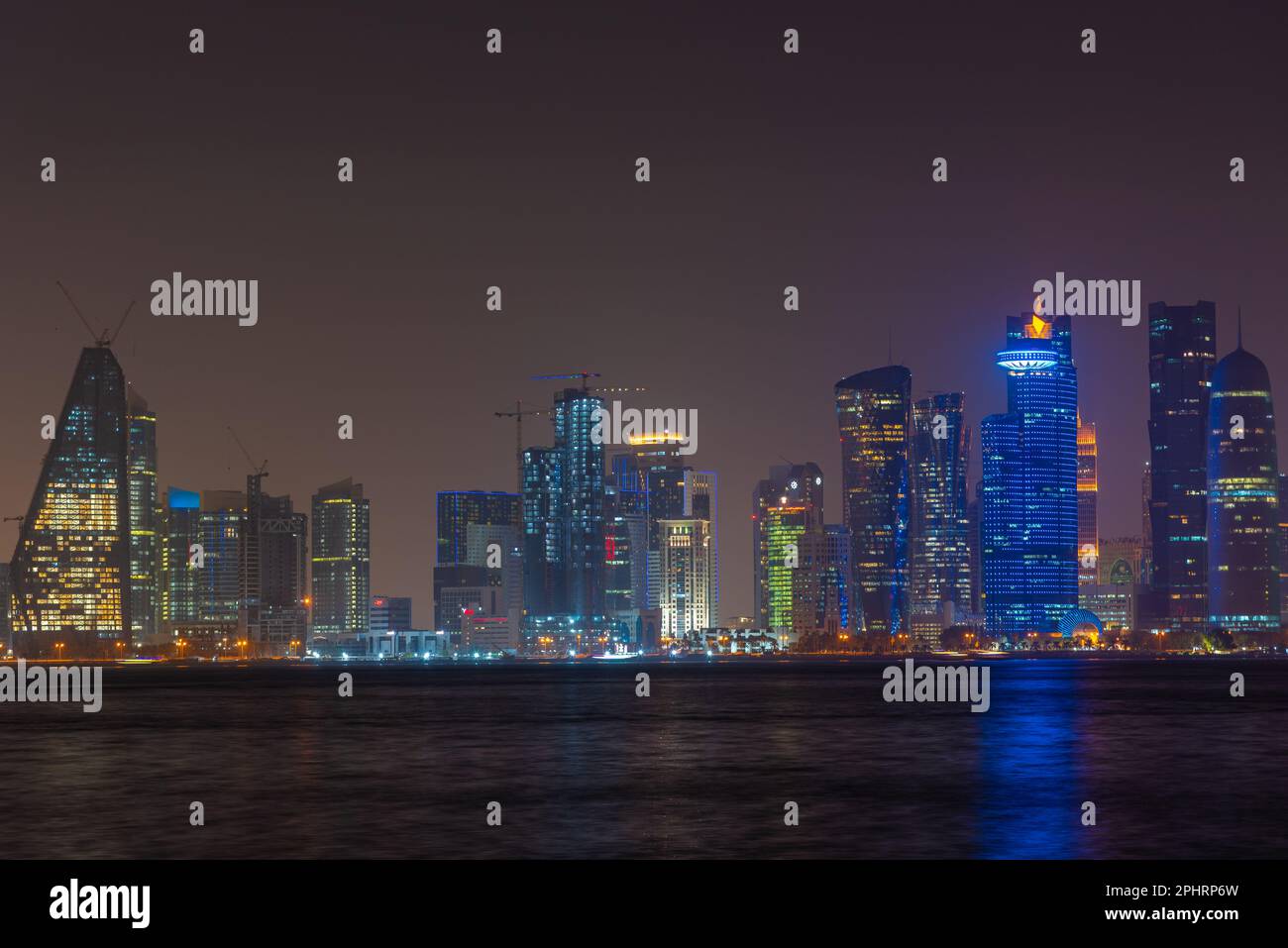 Night view of skyline of Doha - the capital of Qatar Stock Photo - Alamy