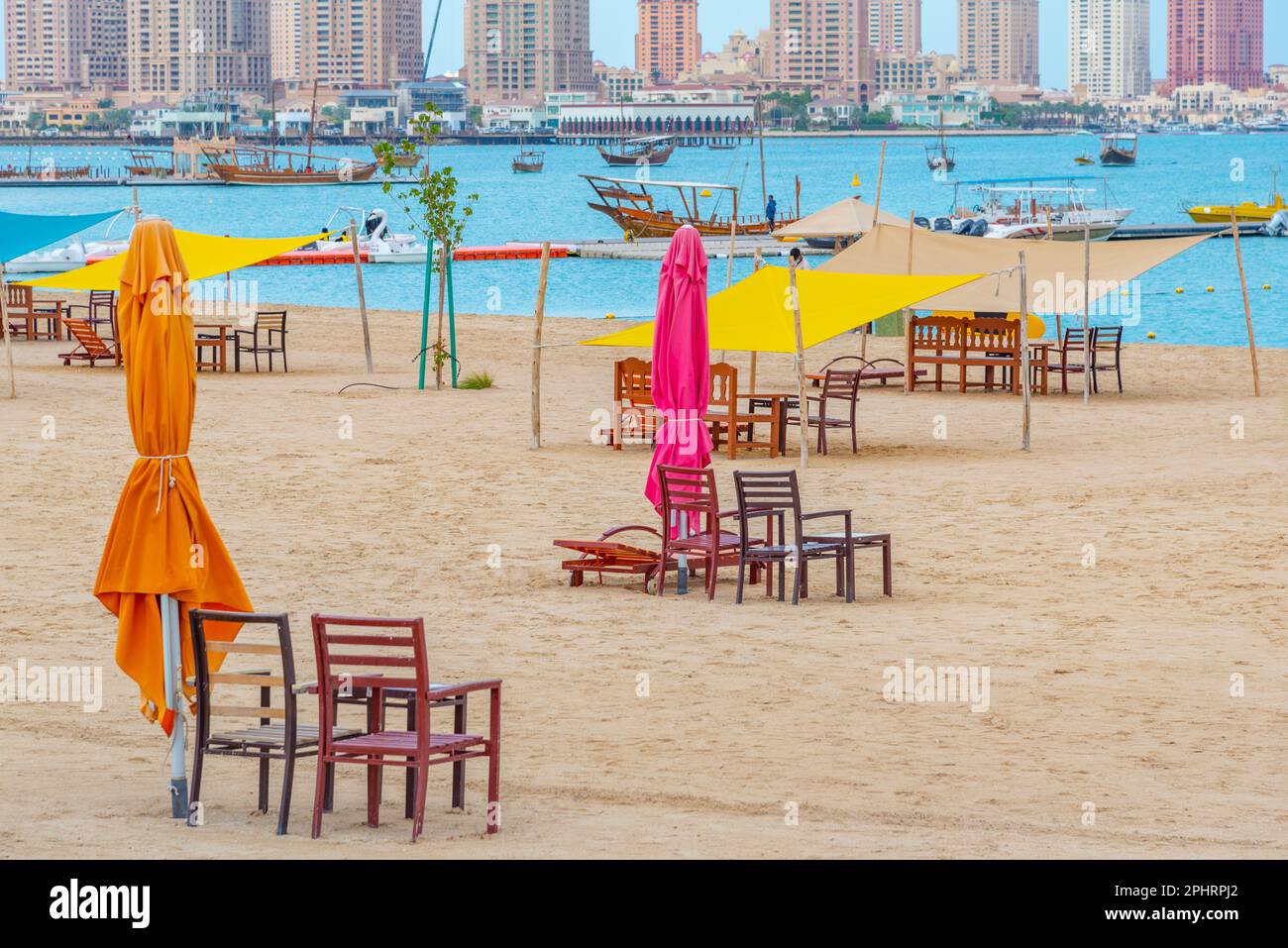 Skyline of Doha viewed behind Katara beach, Qatar Stock Photo - Alamy