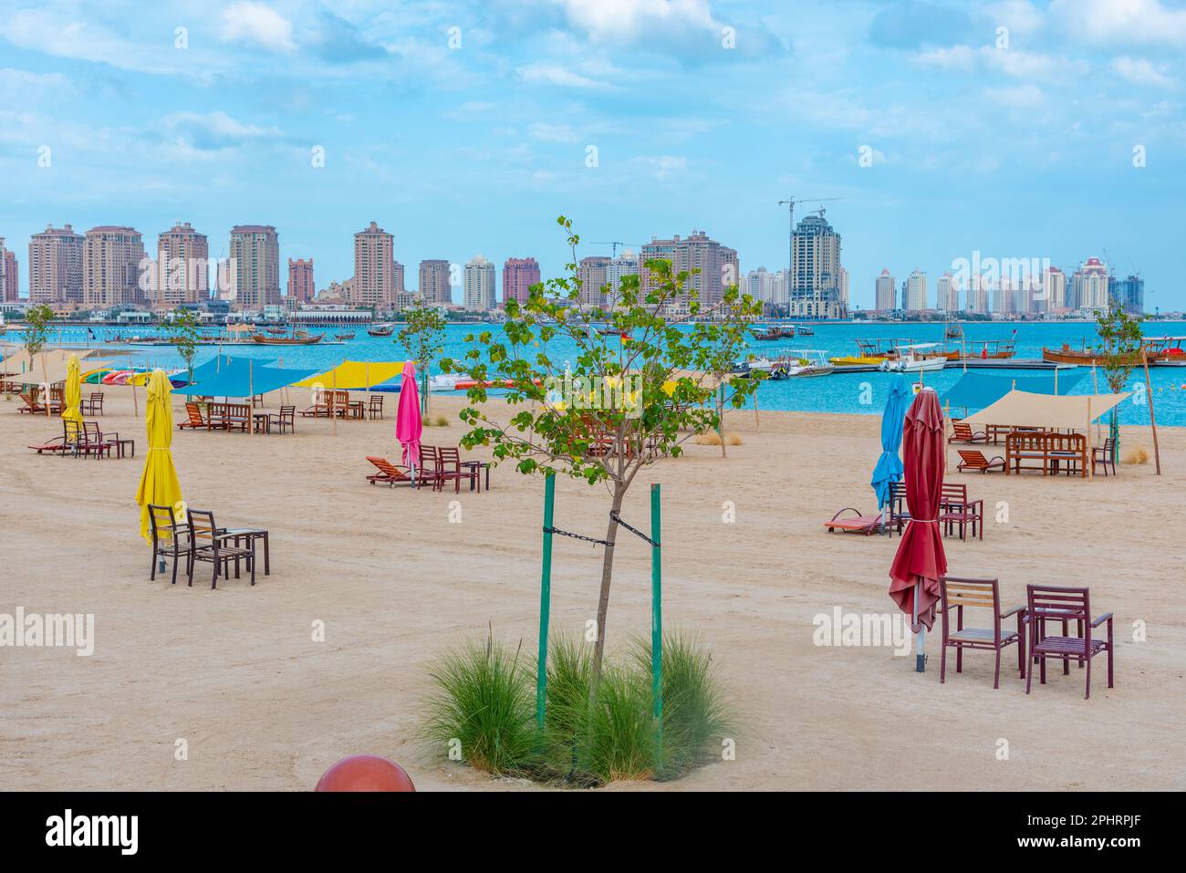 Skyline of Doha viewed behind Katara beach, Qatar Stock Photo - Alamy