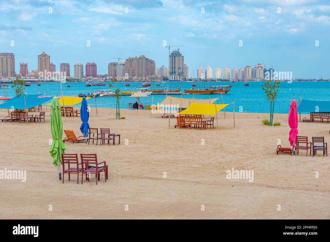 Skyline of Doha viewed behind Katara beach, Qatar Stock Photo - Alamy
