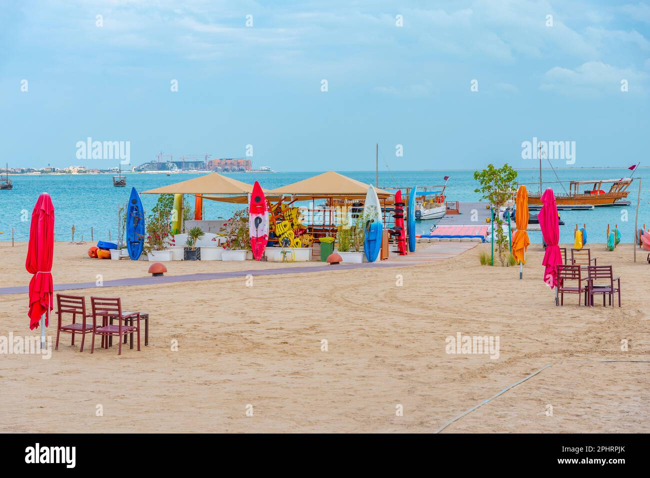 Skyline of Doha viewed behind Katara beach, Qatar Stock Photo - Alamy