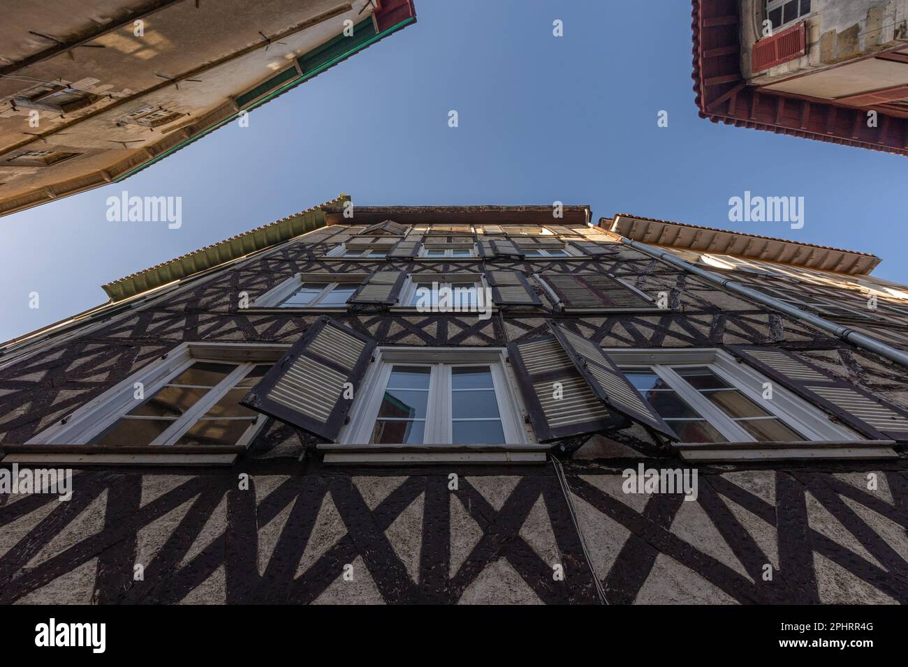 A close-up picture of a half-timbered traditional house in Bayonne ...