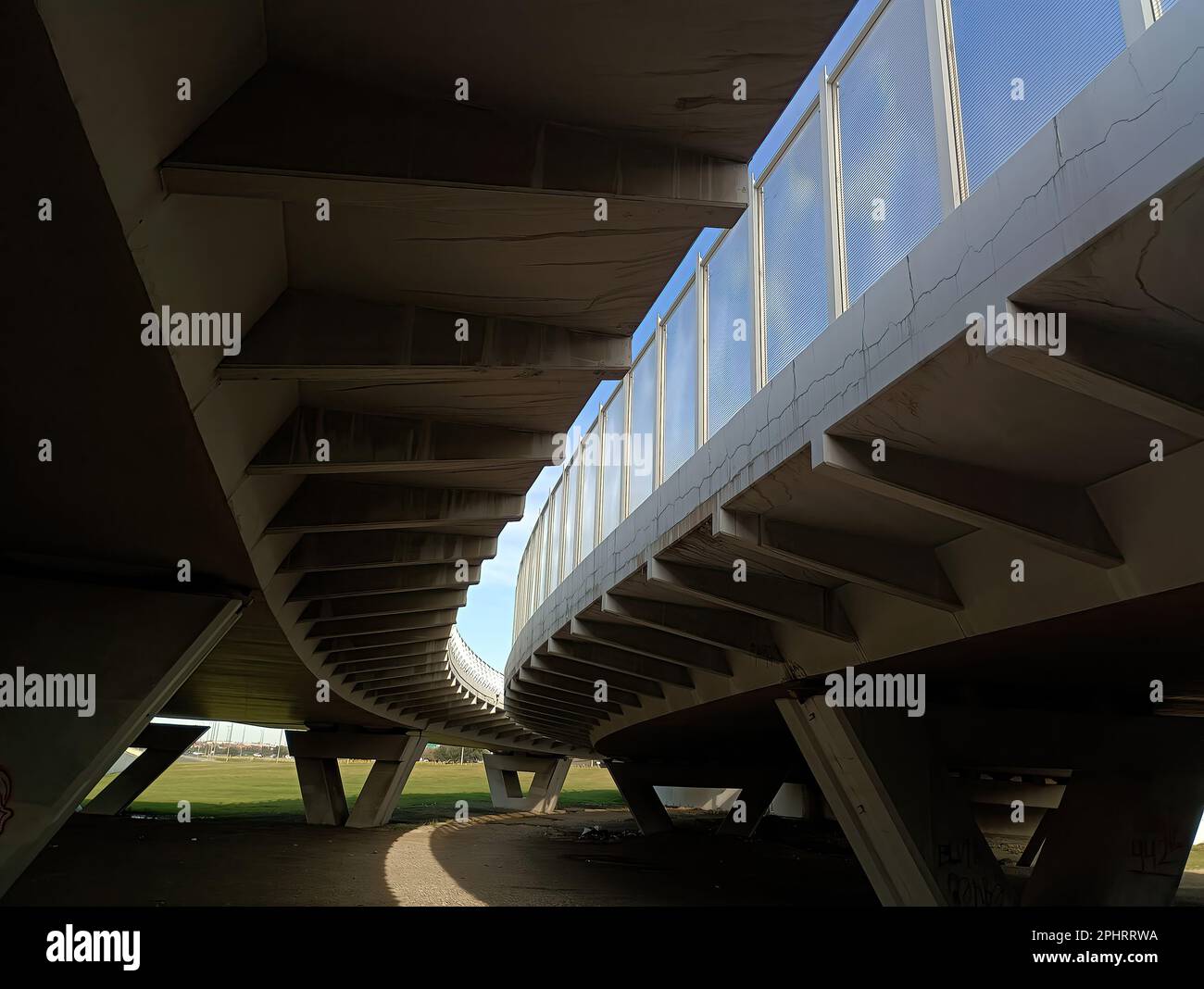 Under bridge. Bottom view of the bottom of the curved bridge Stock ...