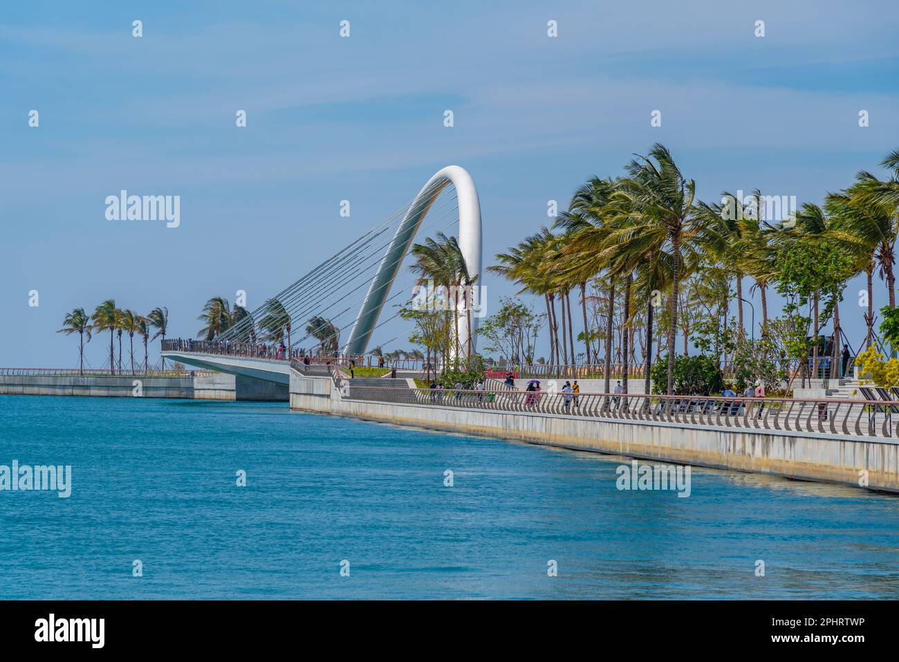 Seaside promenade passing construction site of the Port City in Colombo ...