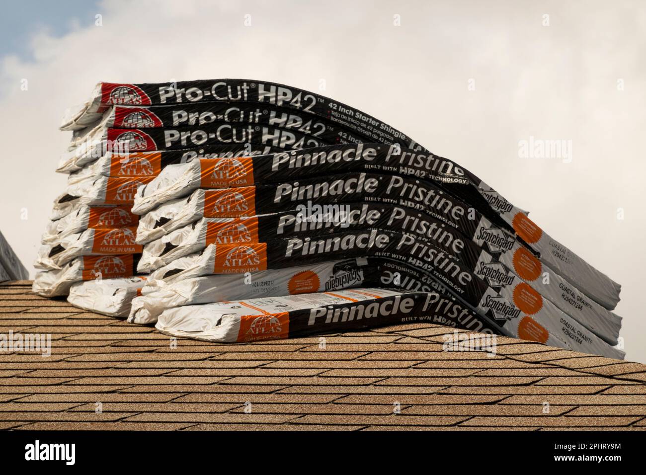 Shingle roof tiles packet hi-res stock photography and images - Alamy
