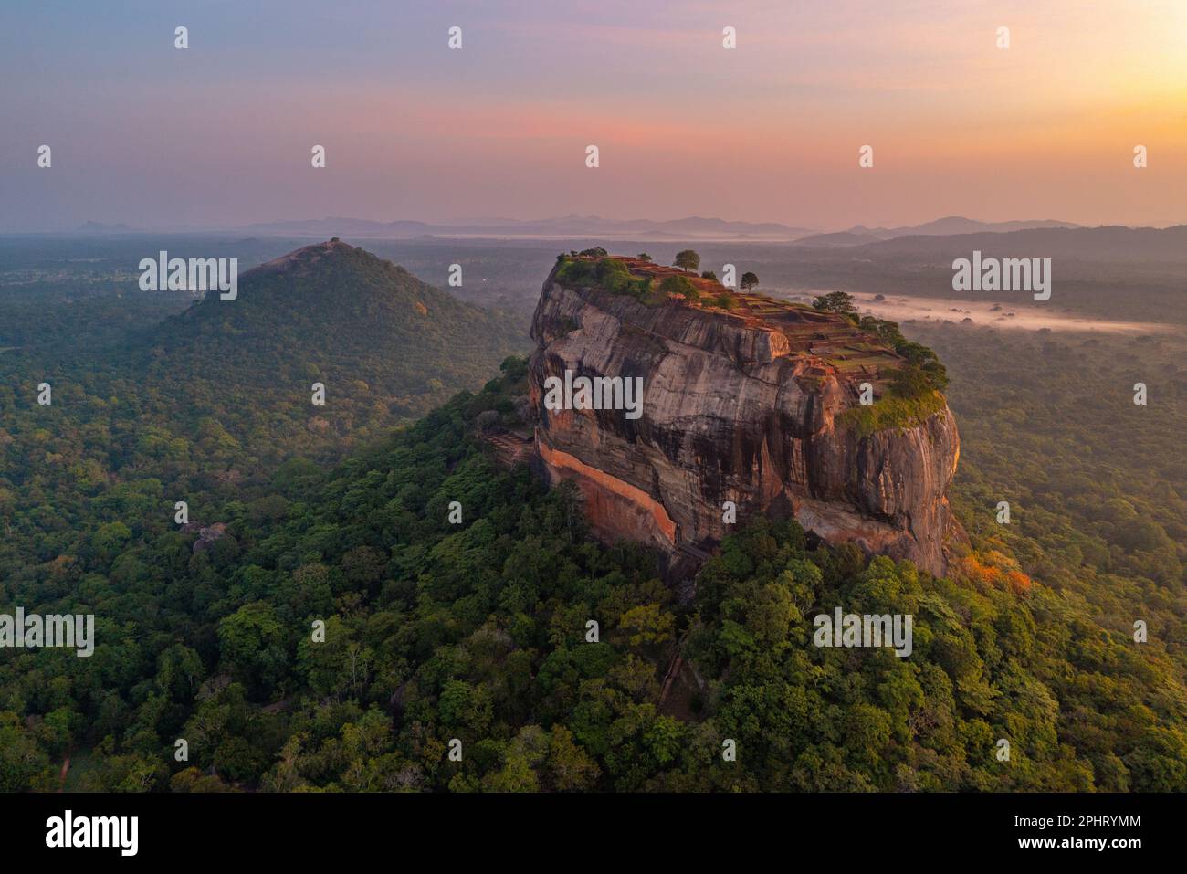 Sunrise aerial view of Sigiriya rock fortress in Sri Lanka Stock Photo ...