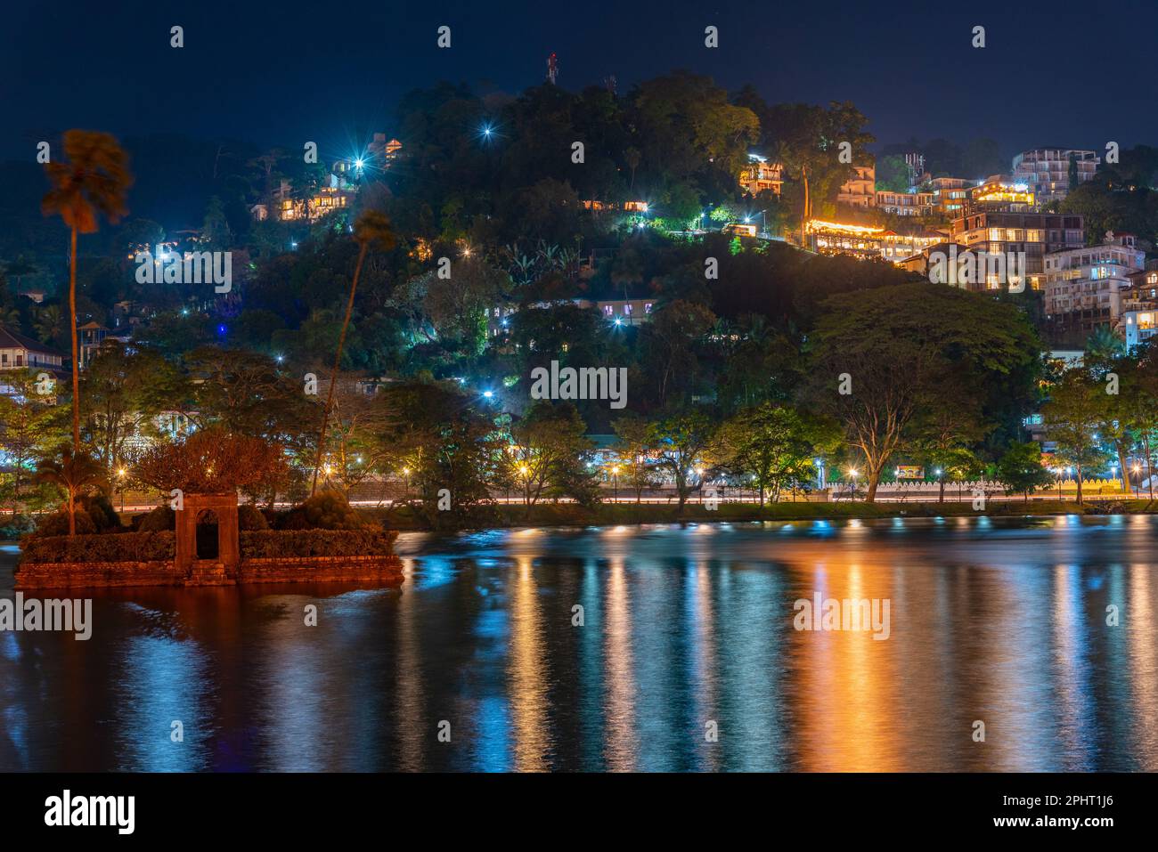 Night view of mansions situated over Kandy lake, Sri Lanka Stock Photo ...
