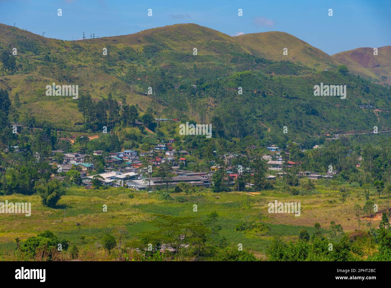 Hilly landscape of Sri Lanka dotted with villages and tea plantations ...