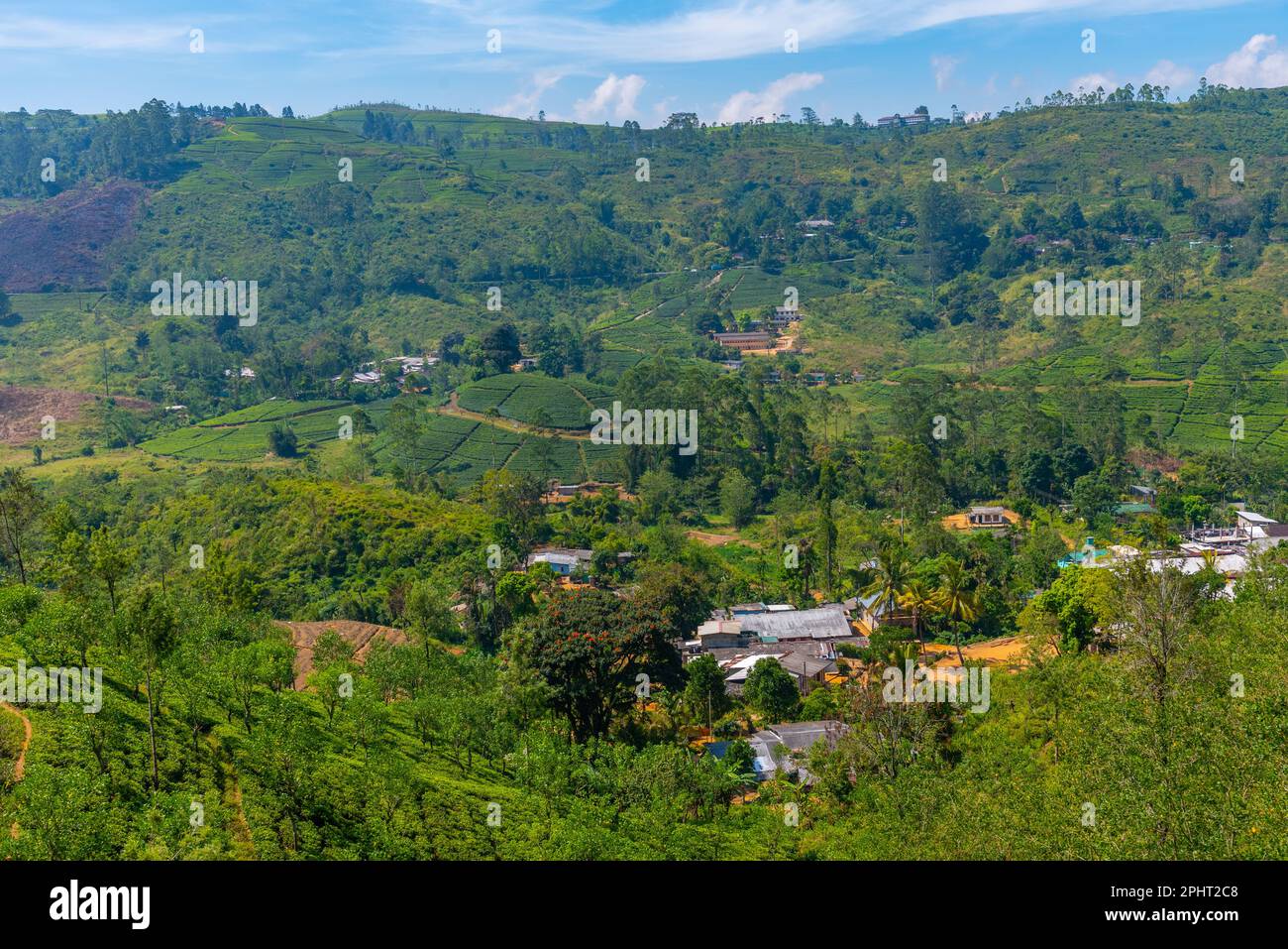 Hilly landscape of Sri Lanka dotted with villages and tea plantations ...