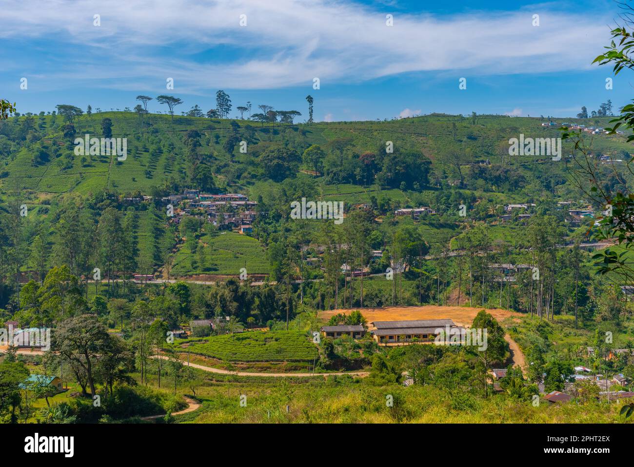 Hilly landscape of Sri Lanka dotted with villages and tea plantations ...