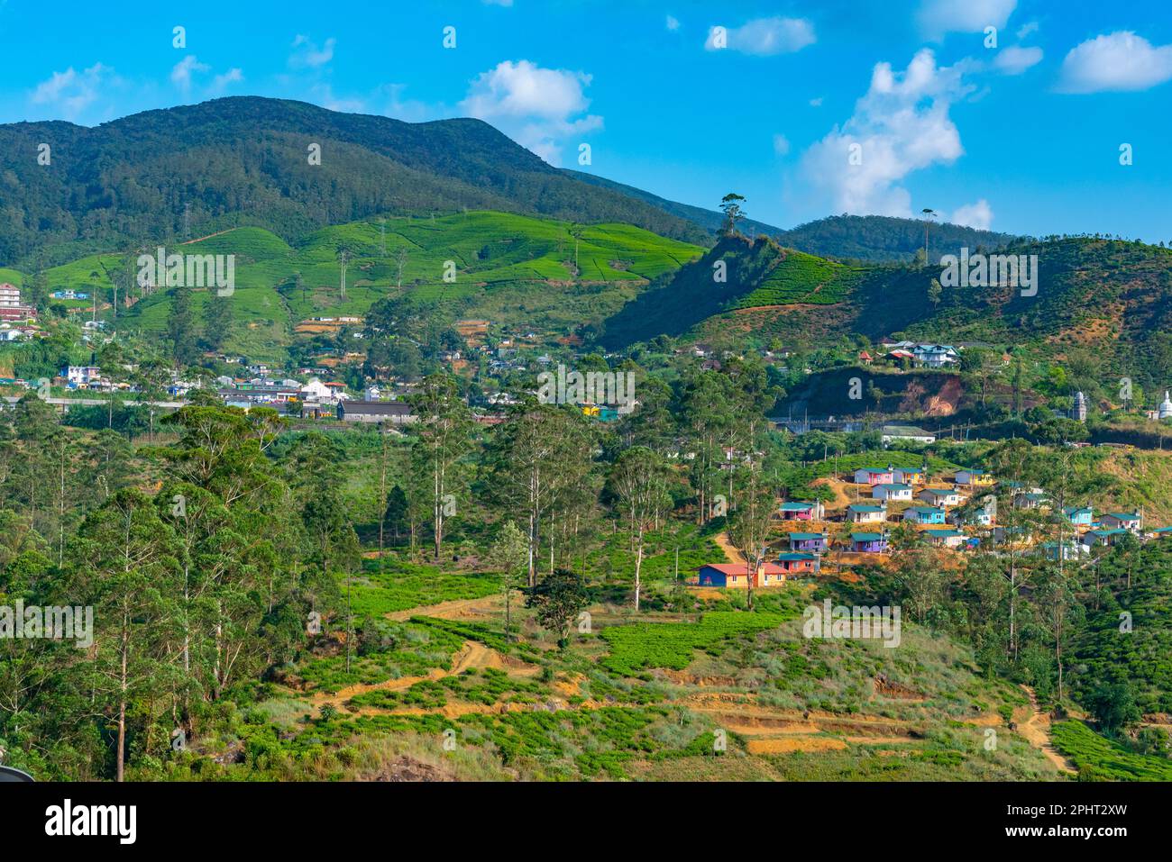 Hilly landscape of Sri Lanka dotted with villages and tea plantations ...
