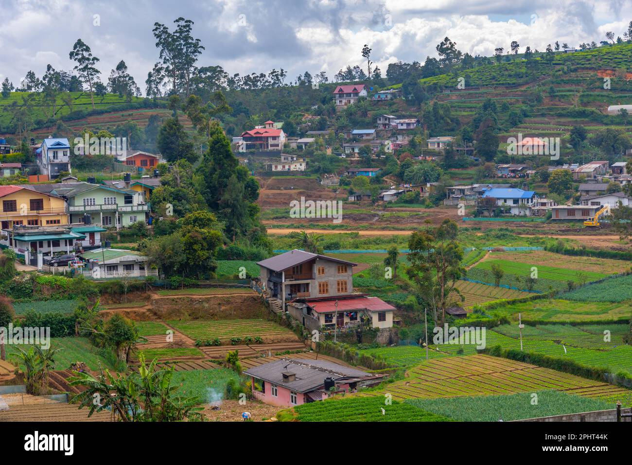 Hilly landscape of Sri Lanka dotted with villages and tea plantations ...