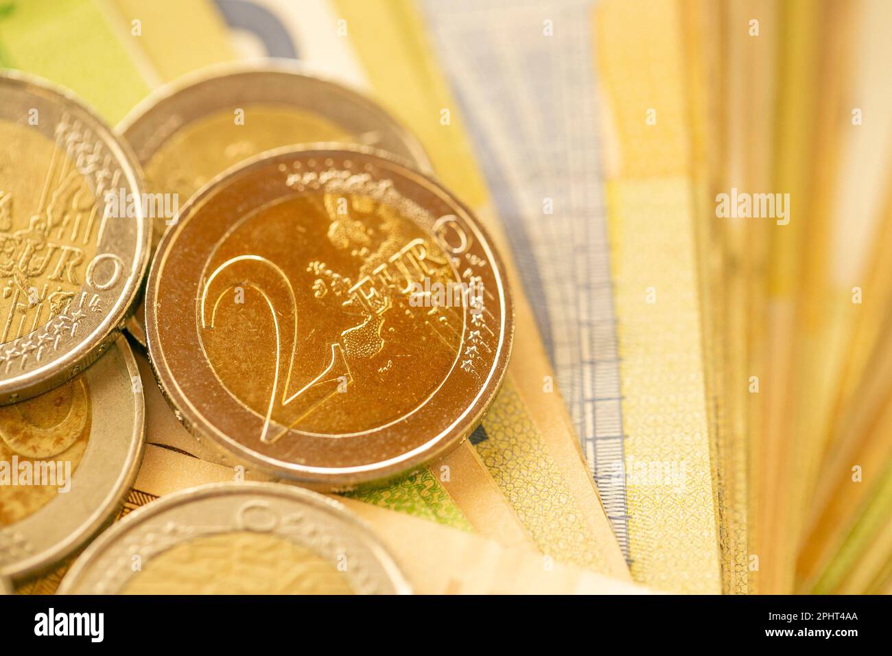 Money and financeEuro banknotes and coins close-up.Expenses and incomes ...
