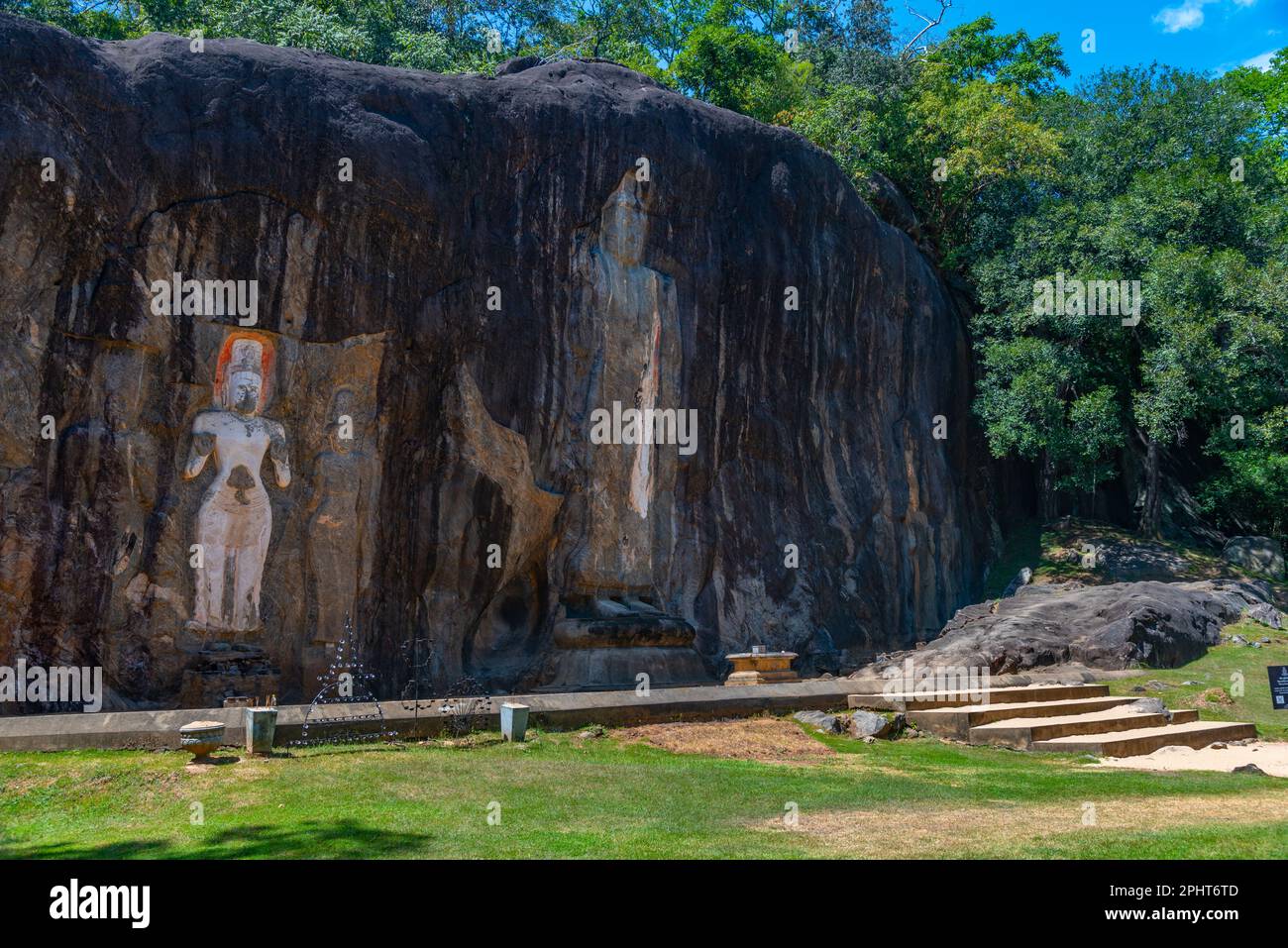 Buddha statues carved into stone at buduruwagala ancient site at Sri ...