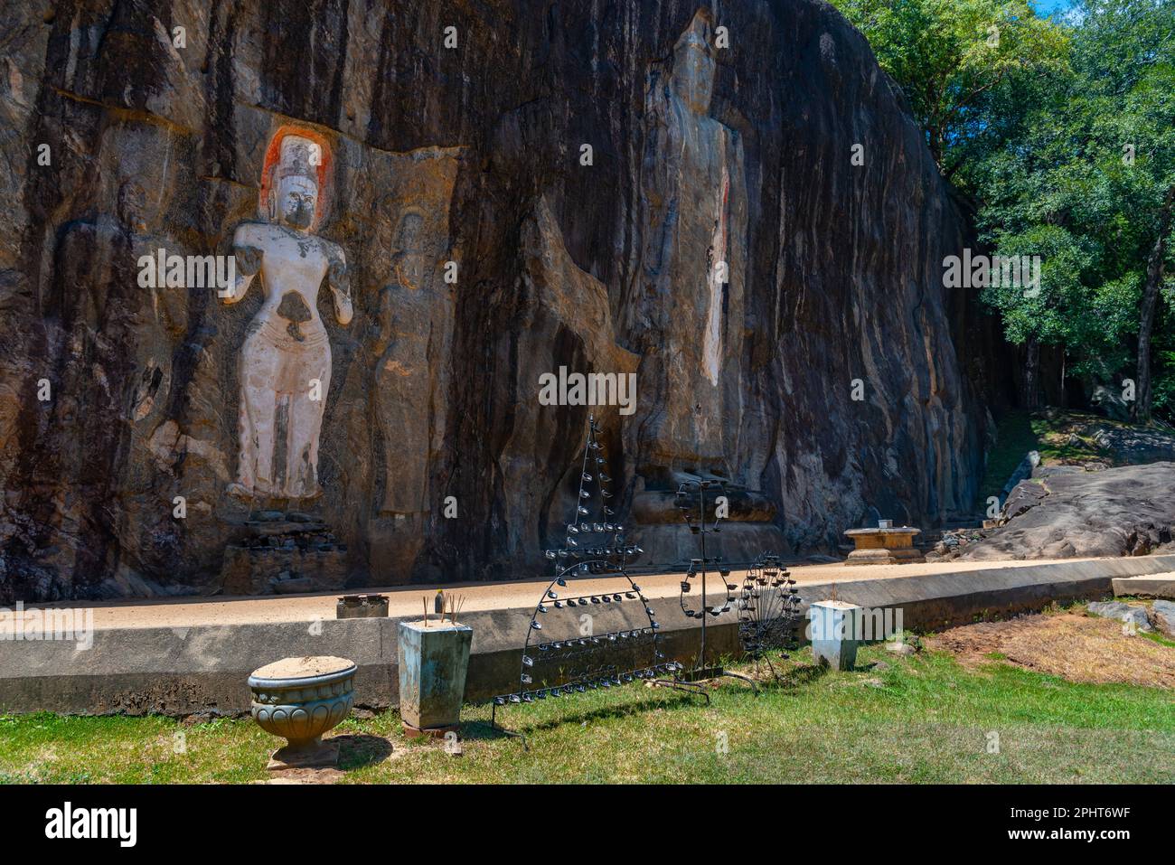 Buddha statues carved into stone at buduruwagala ancient site at Sri ...