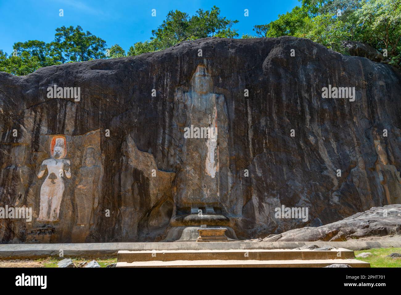 Buddha statues carved into stone at buduruwagala ancient site at Sri ...