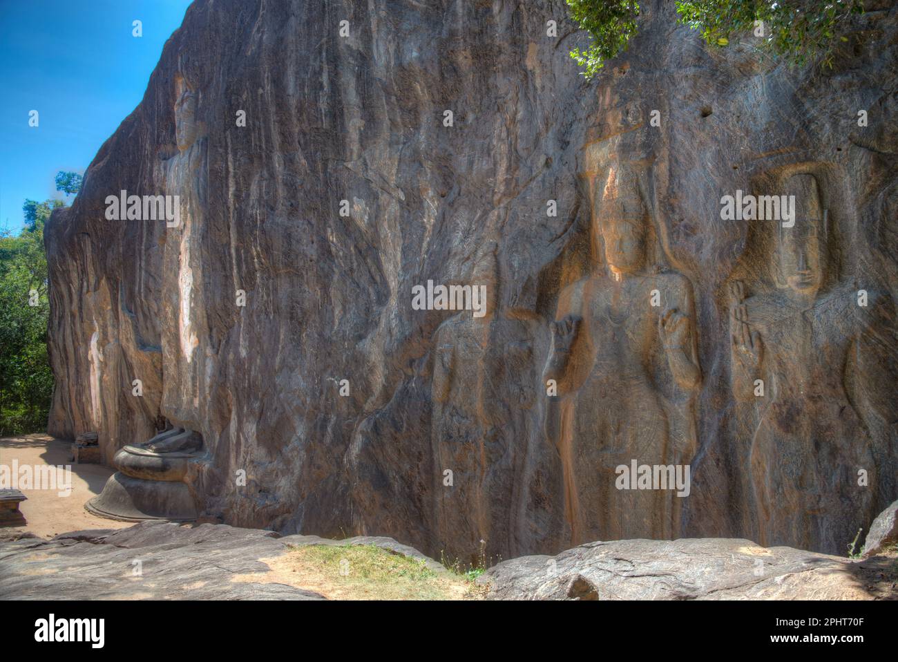 Buddha statues carved into stone at buduruwagala ancient site at Sri ...