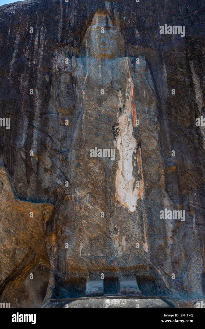 Buddha statues carved into stone at buduruwagala ancient site at Sri ...