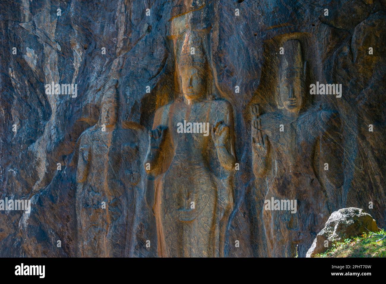 Buddha statues carved into stone at buduruwagala ancient site at Sri ...