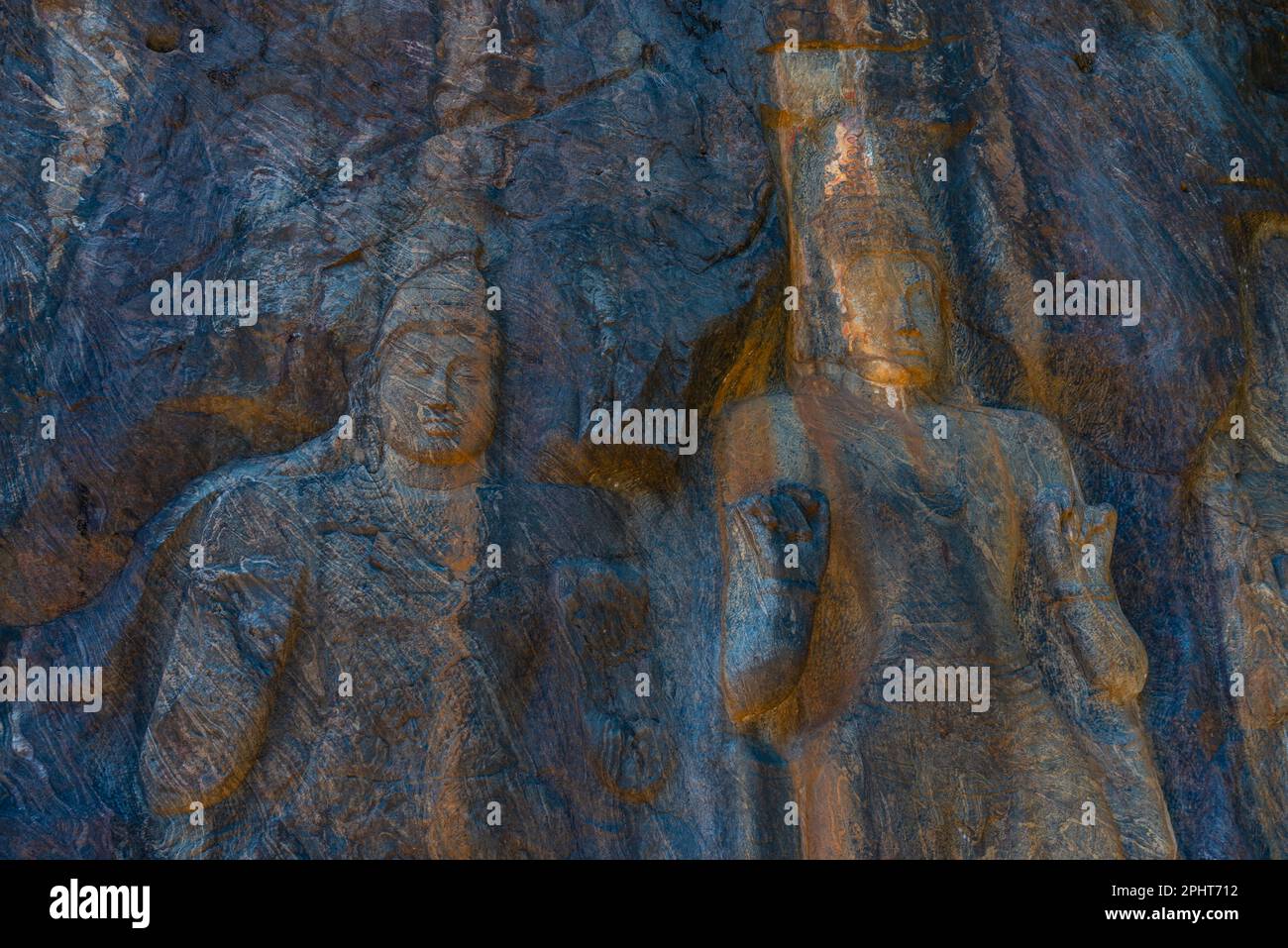 Buddha statues carved into stone at buduruwagala ancient site at Sri ...