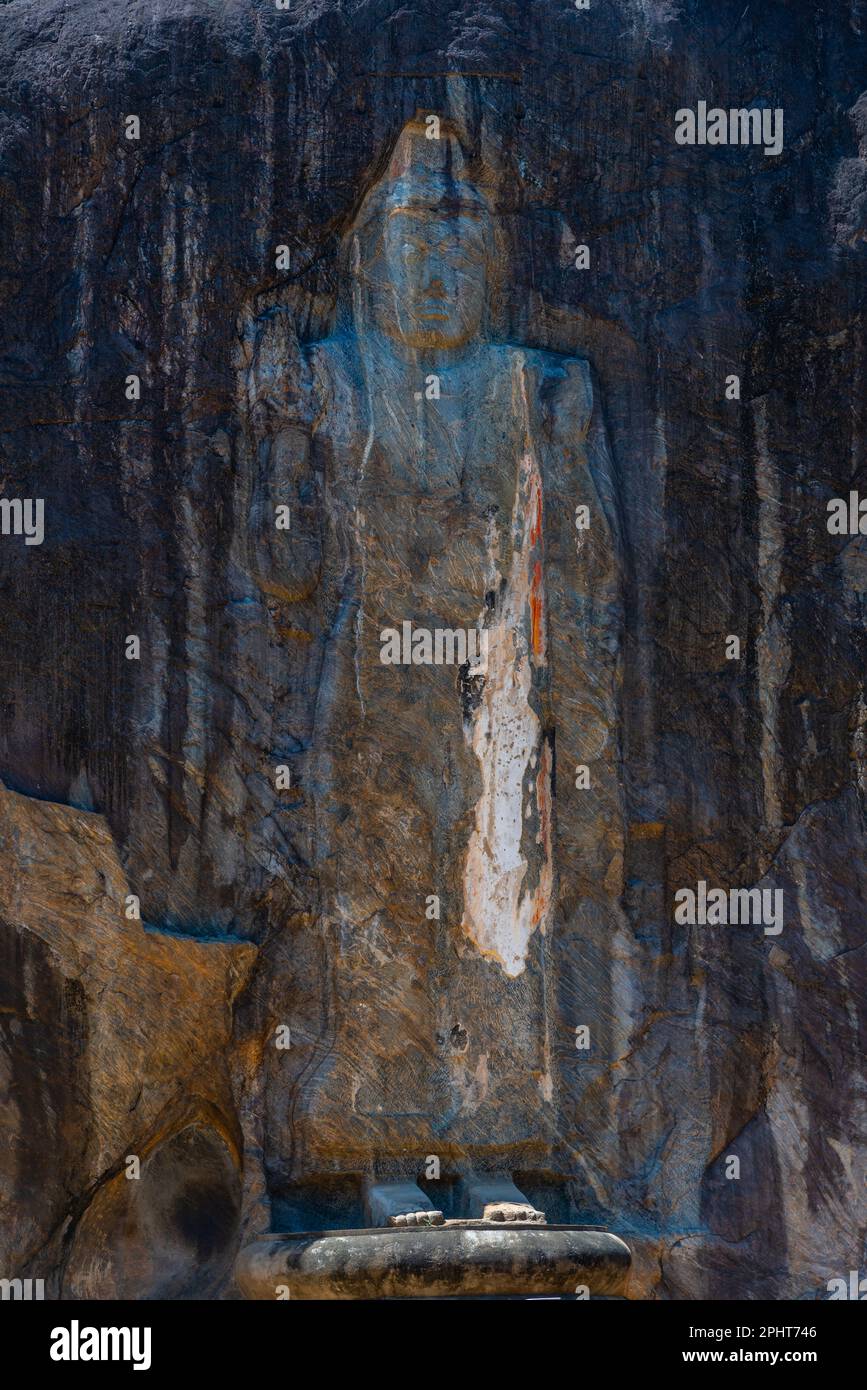 Buddha statues carved into stone at buduruwagala ancient site at Sri ...