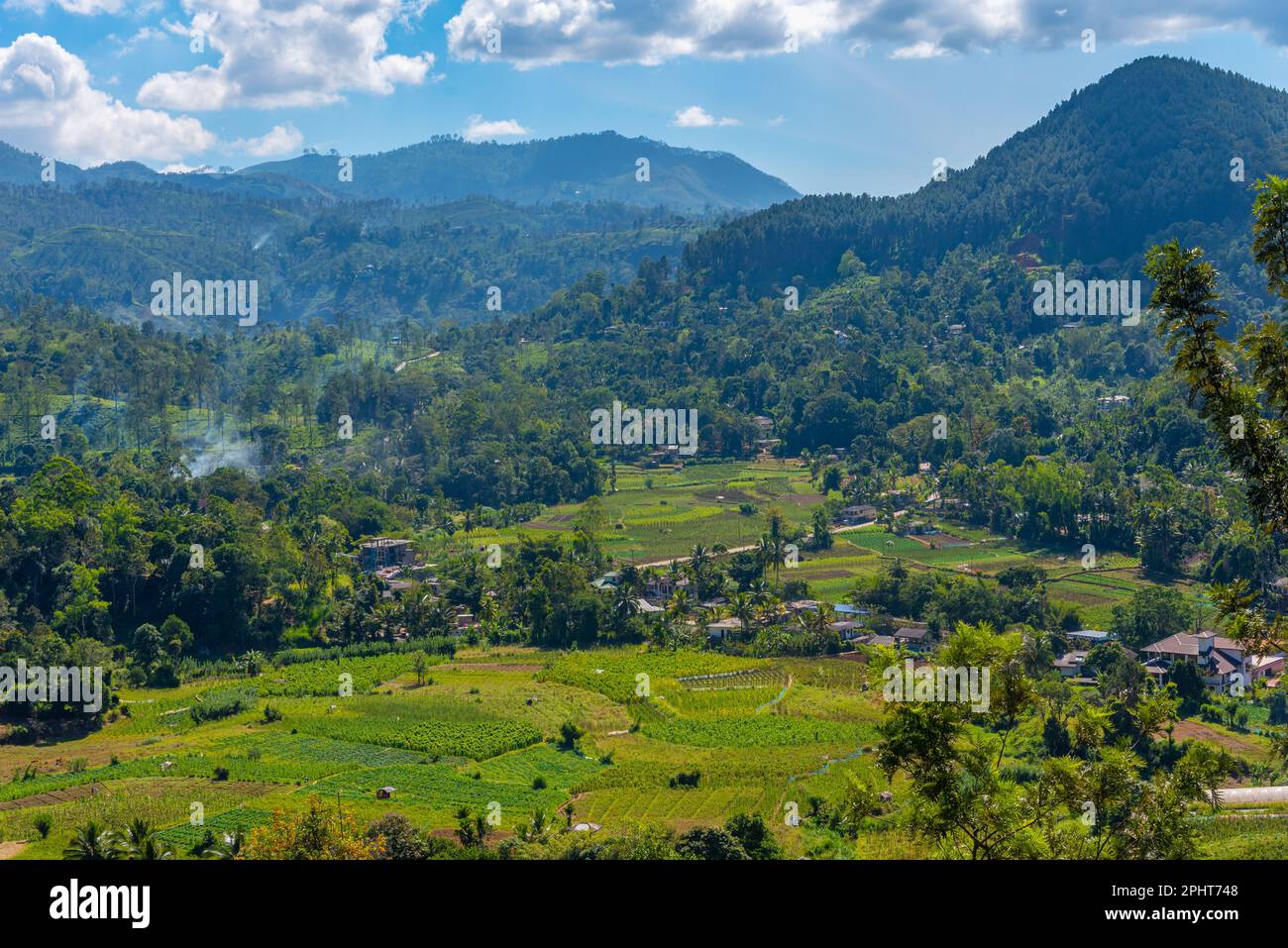 Hilly landscape of Sri Lanka dotted with villages and tea plantations ...