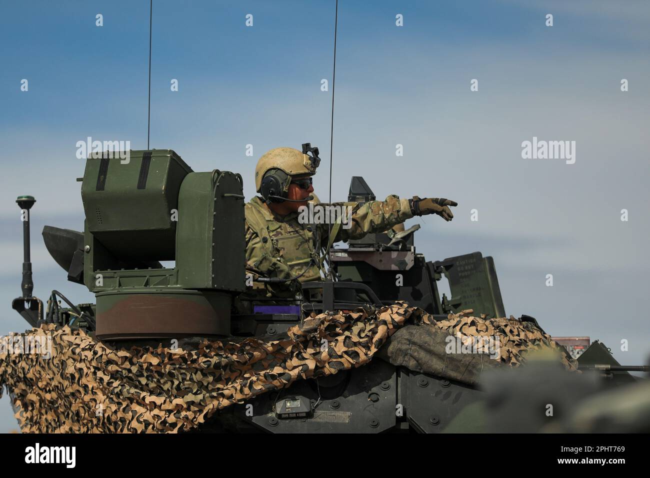 A modernized M2A4 Bradley Fighting Vehicle commander assigned to the ...