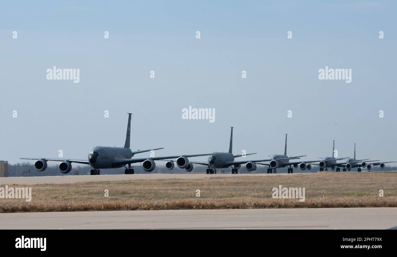 Five KC-135 Stratotankers taxi on a runway for an elephant walk during ...