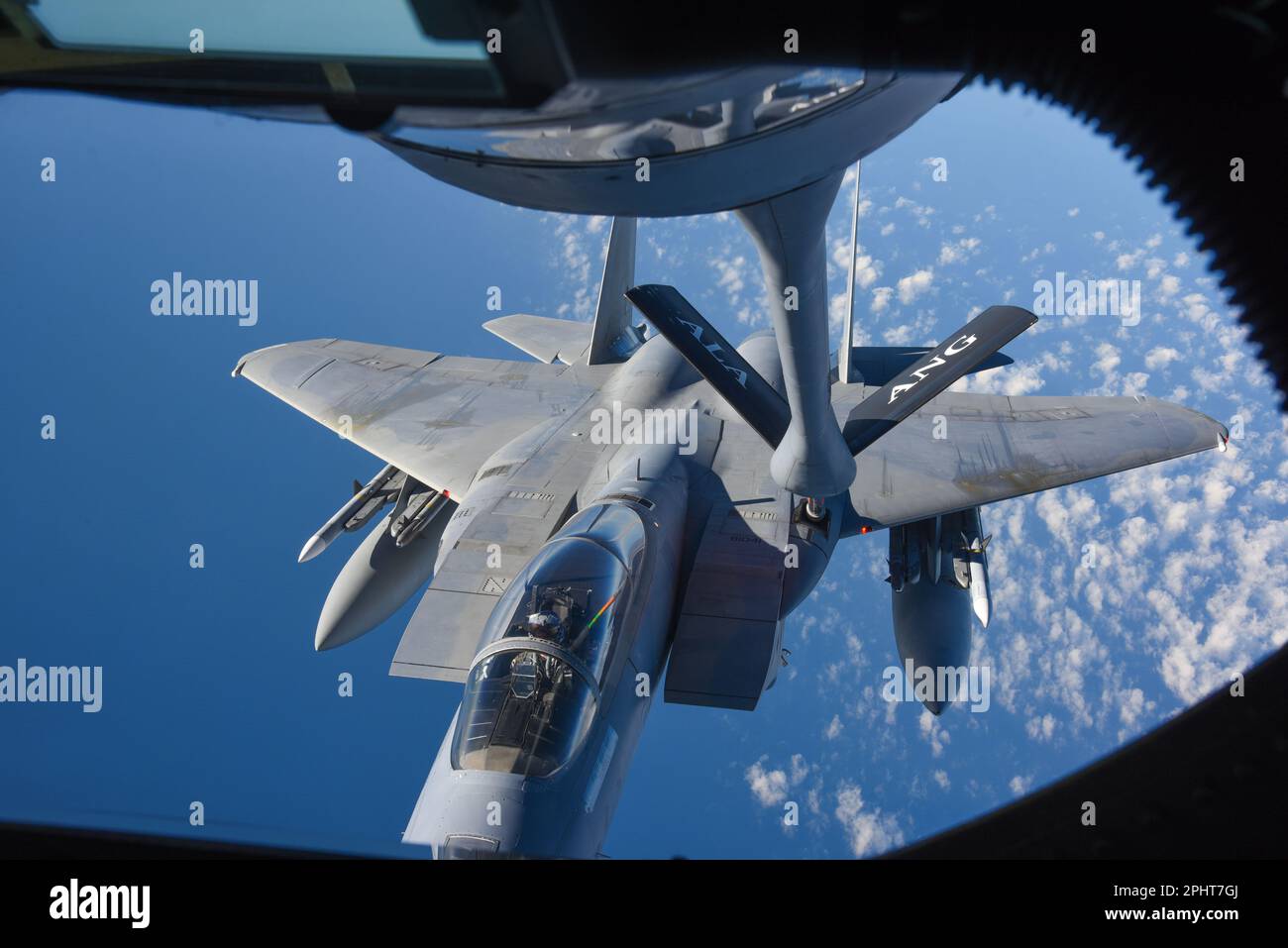 NORAD aircraft receive fuel via air refueling from a U.S. Air Force KC ...