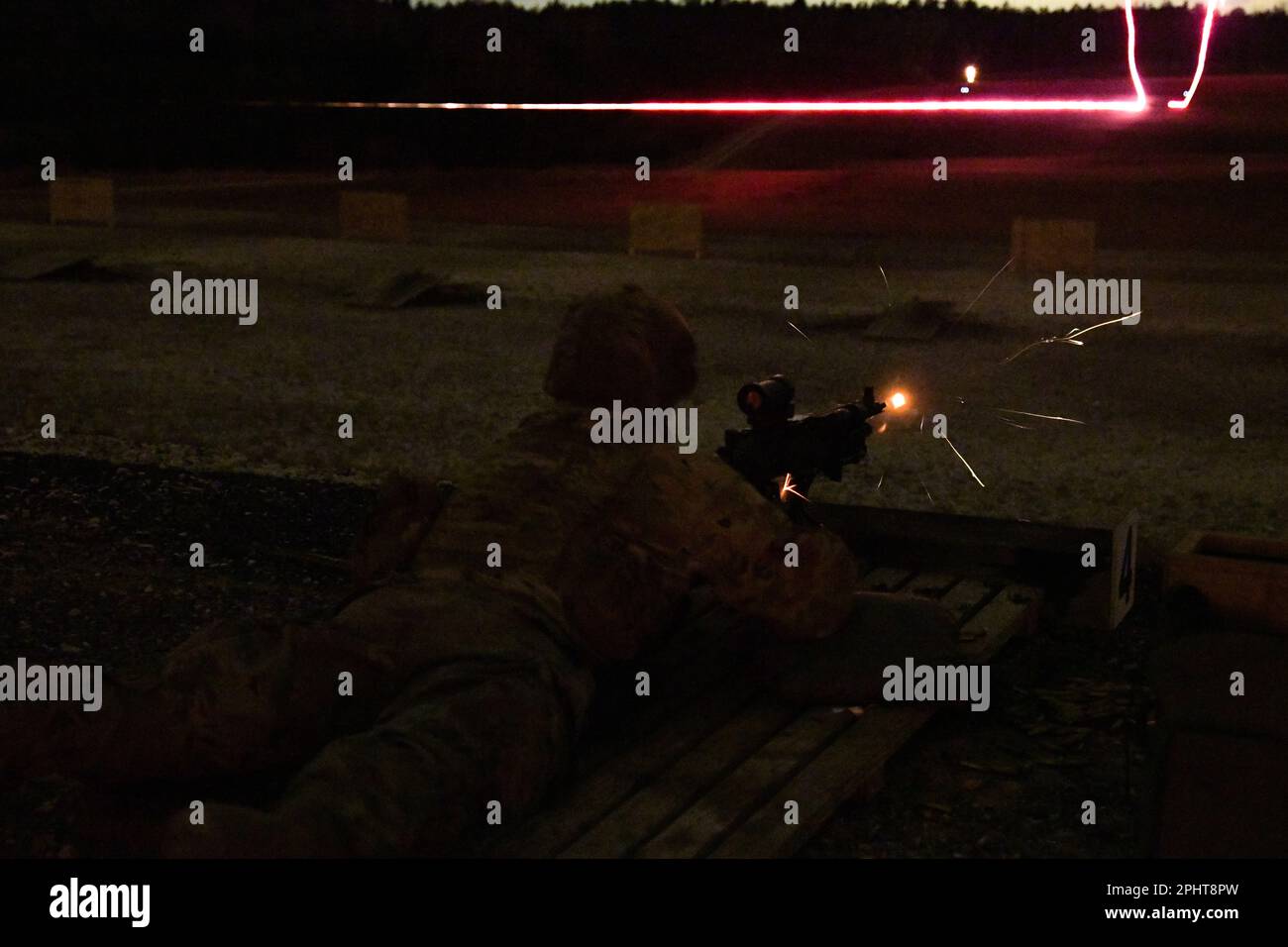 A U.S. Soldier assigned to 4th Squadron, 2nd Cavalry Regiment fires the ...