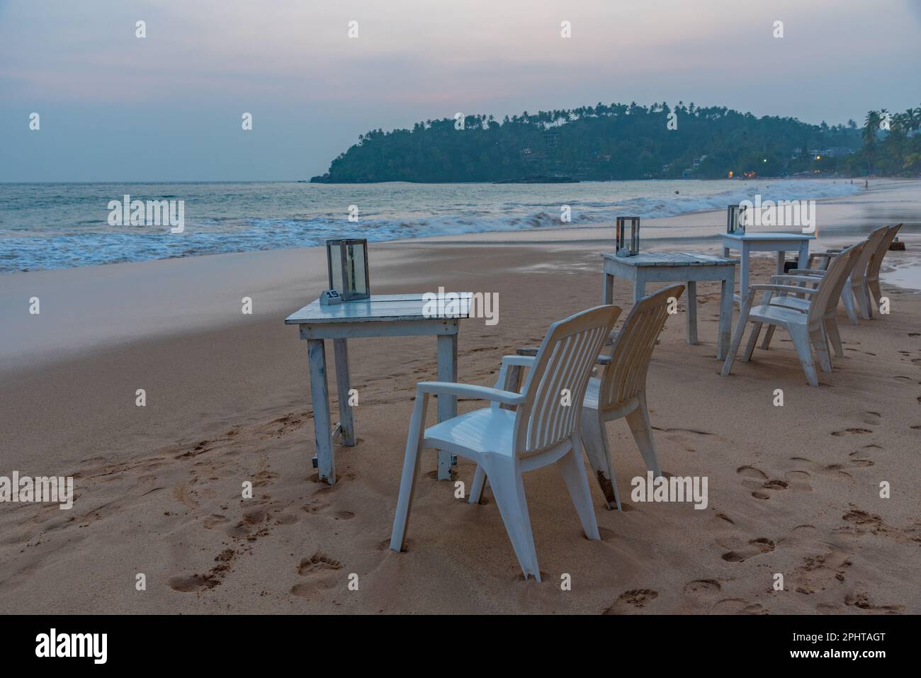 Sunset view of a beach restaurant at Mirissa beach, Sri Lanka Stock ...