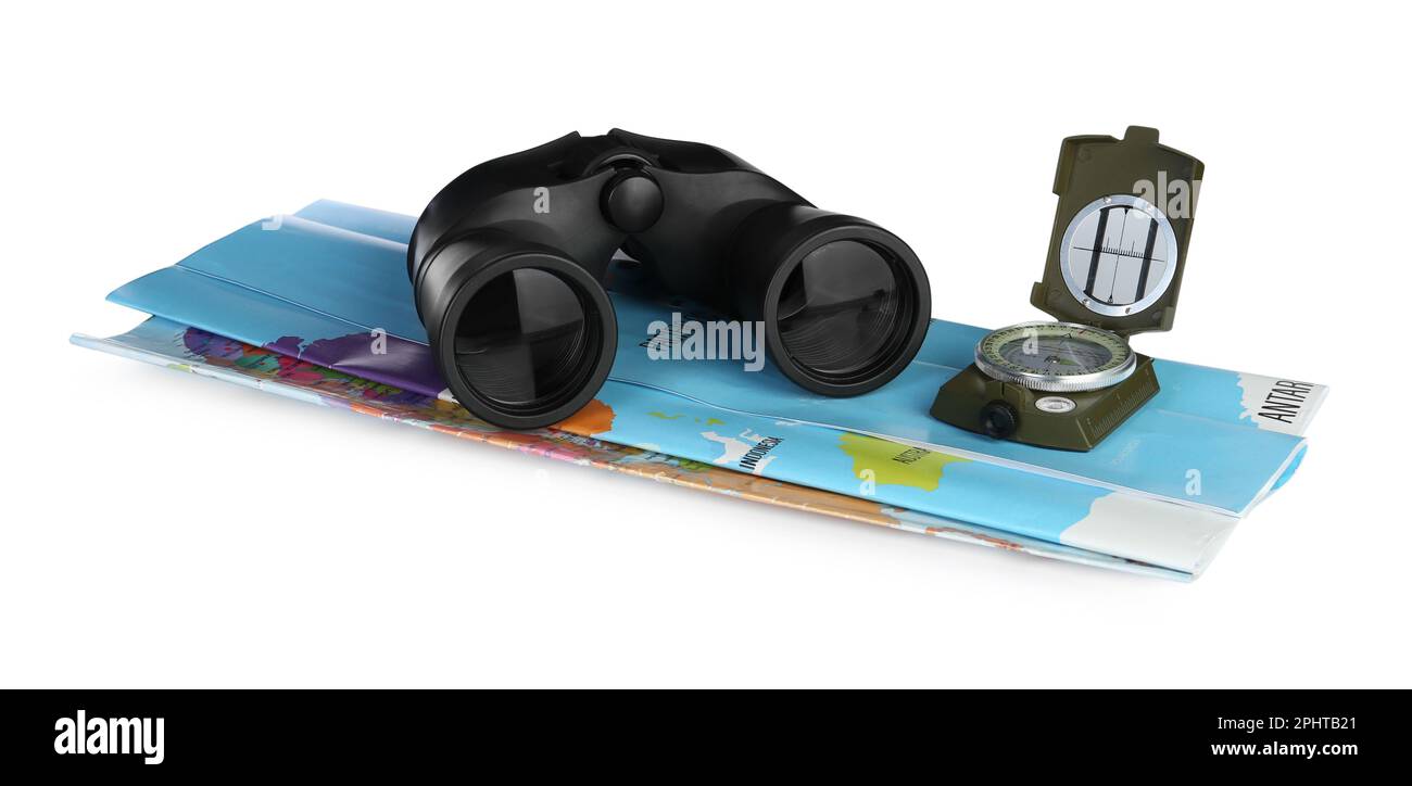 Modern binoculars, compass and map on white background Stock Photo - Alamy