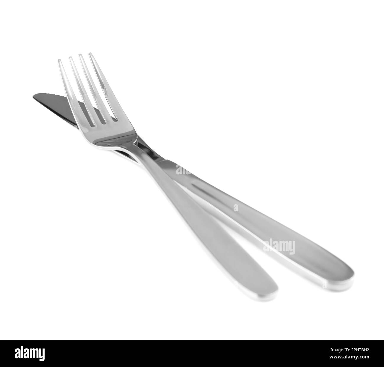 Shiny fork and knife on white background Stock Photo - Alamy