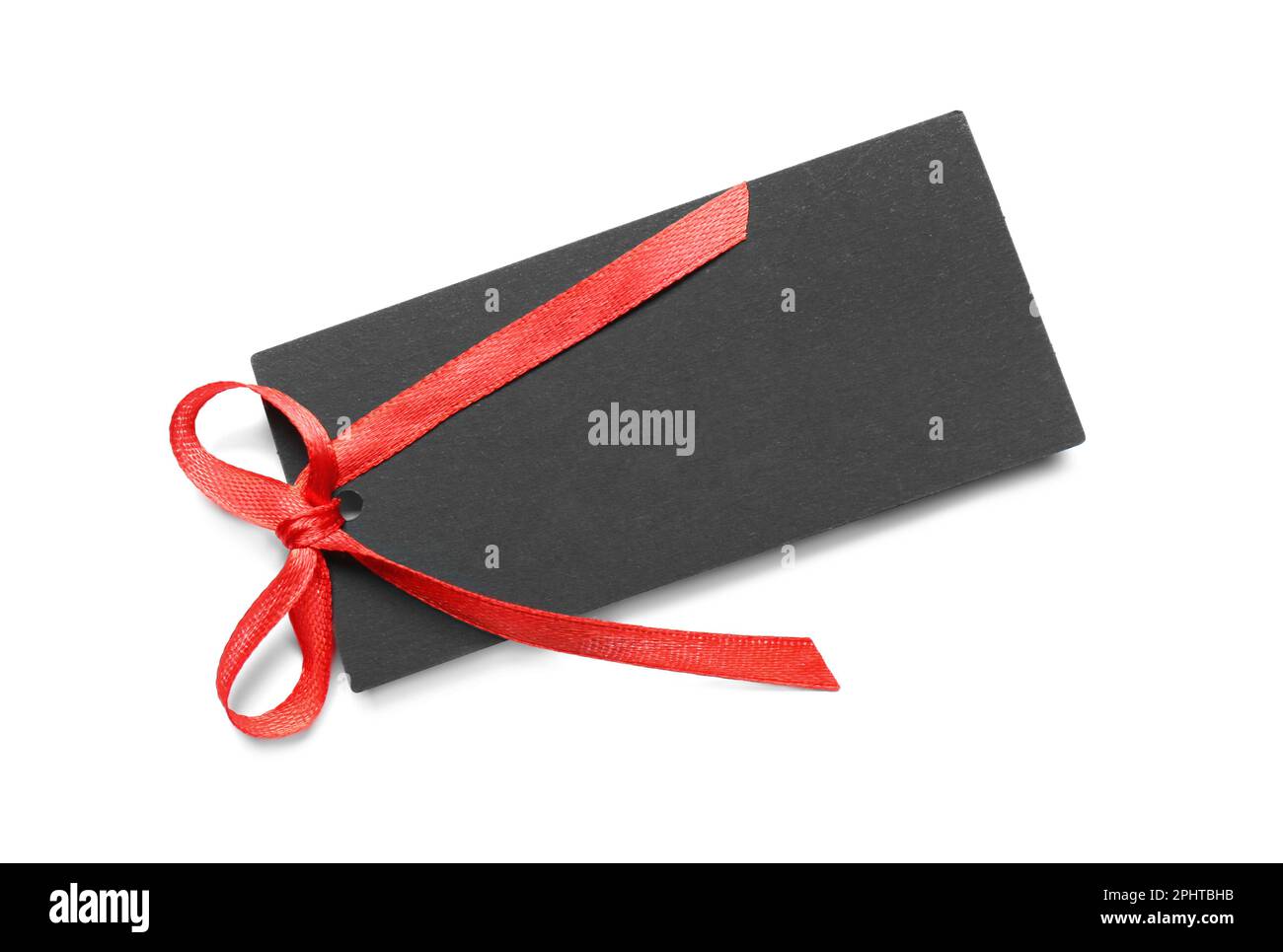 Blank black gift tag with red satin ribbon on white background, top ...