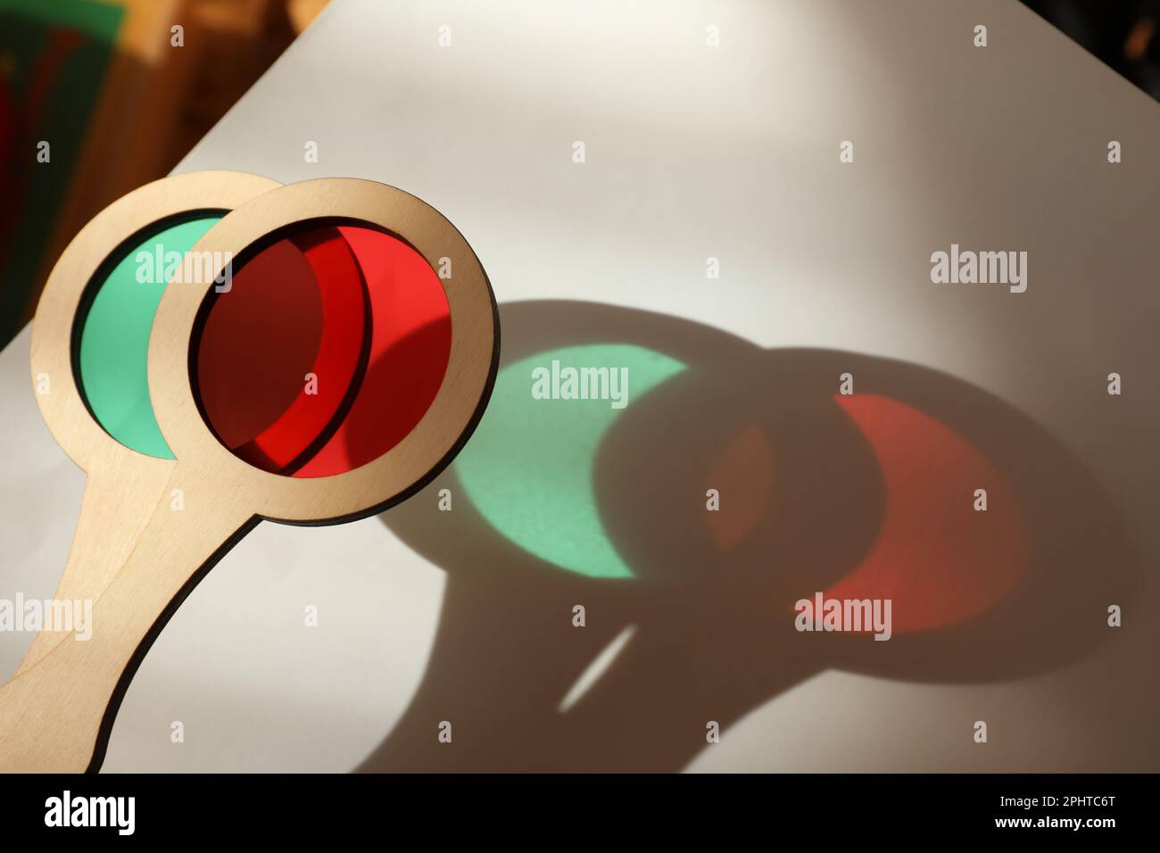 Colorful magnifiers on white background, closeup. Montessori toy Stock ...