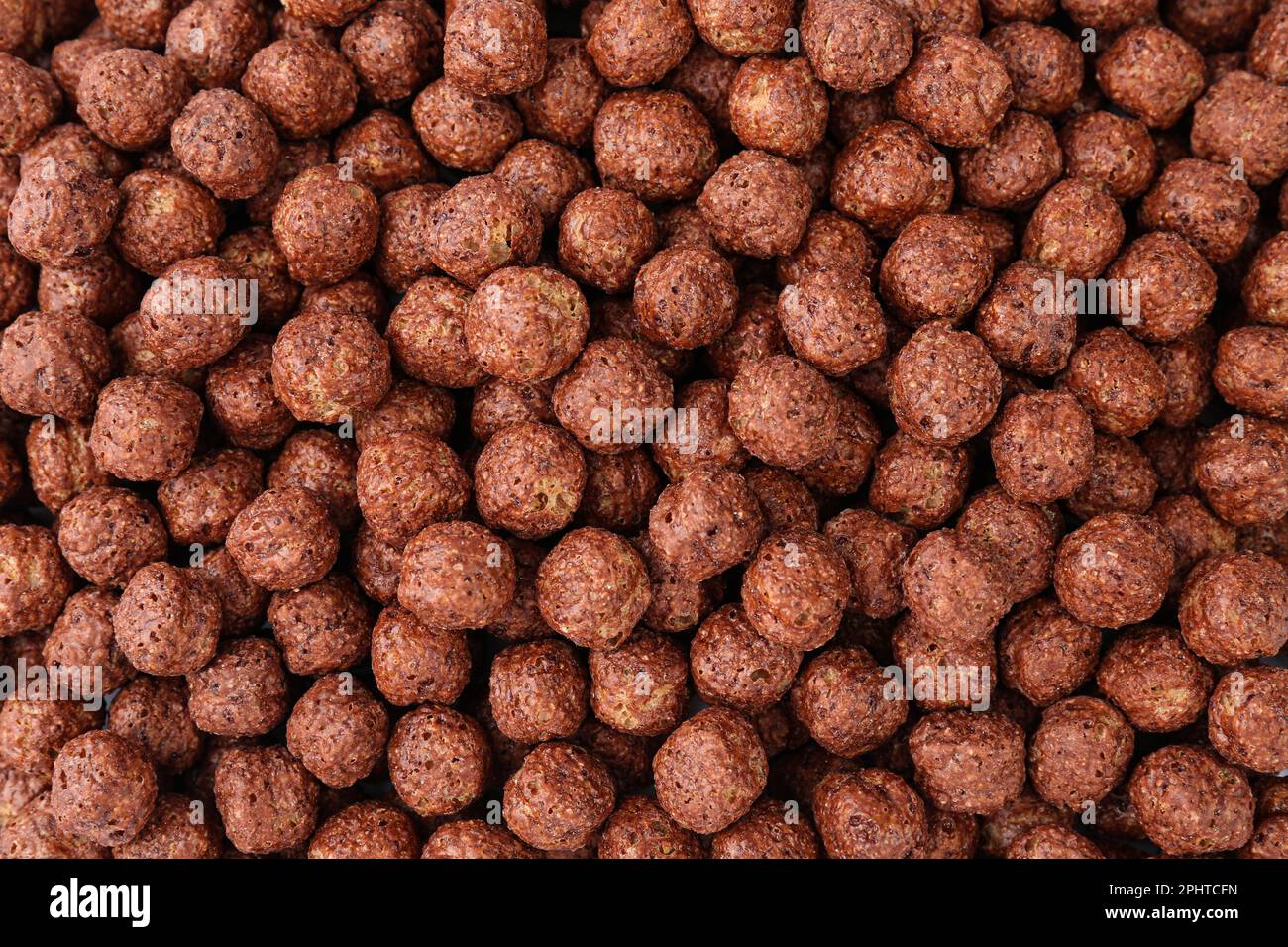 Sweet crispy chocolate corn balls as background, top view Stock Photo ...