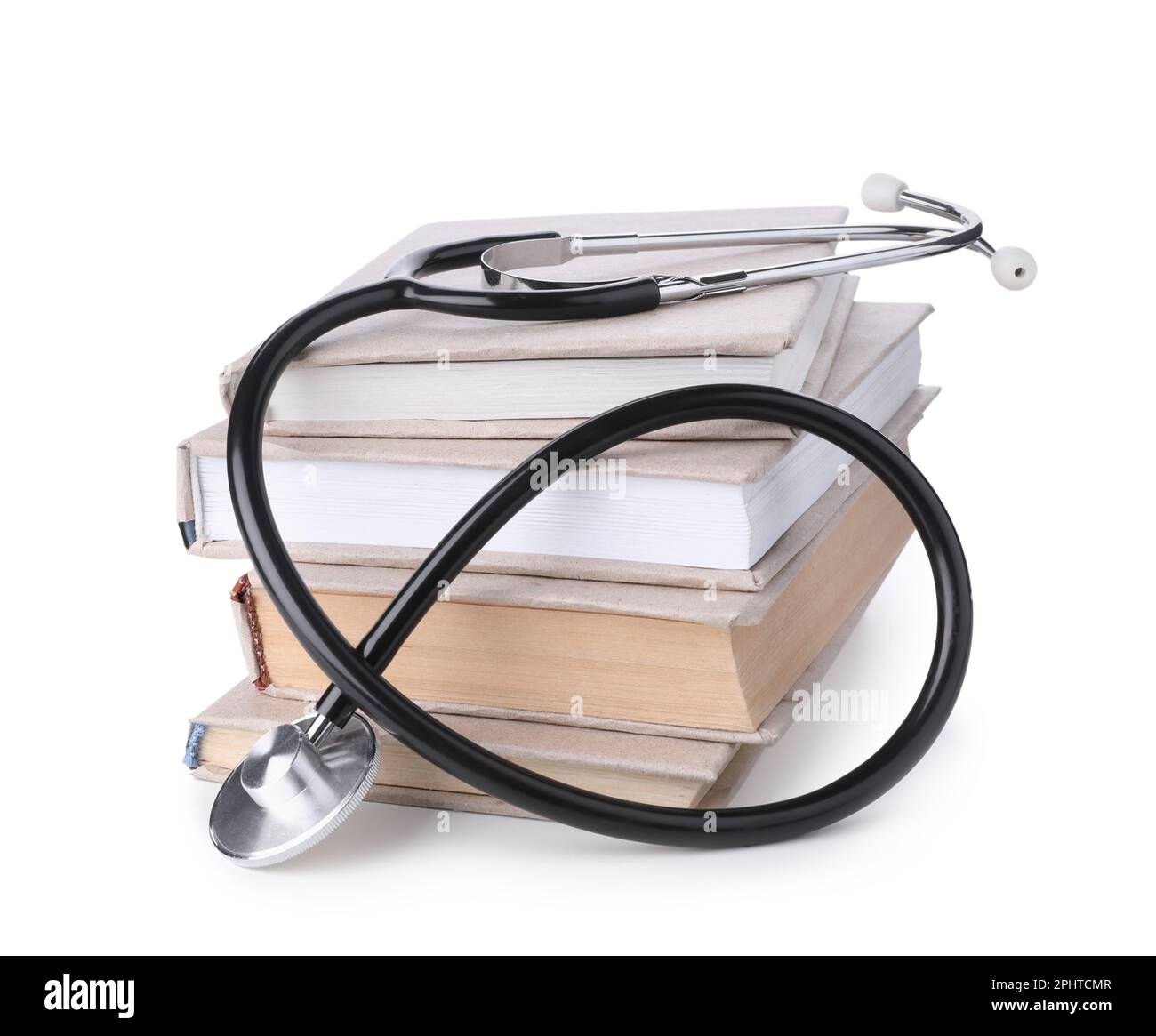 Stack of student textbooks and stethoscope on white background. Medical ...
