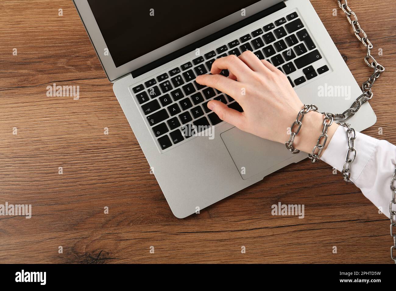 Woman chained hand typing hi-res stock photography and images - Alamy