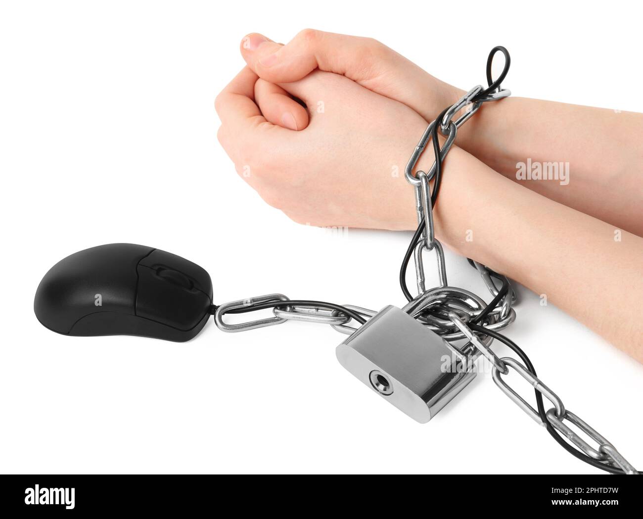 Woman chained to computer mouse on white background, closeup. Internet ...